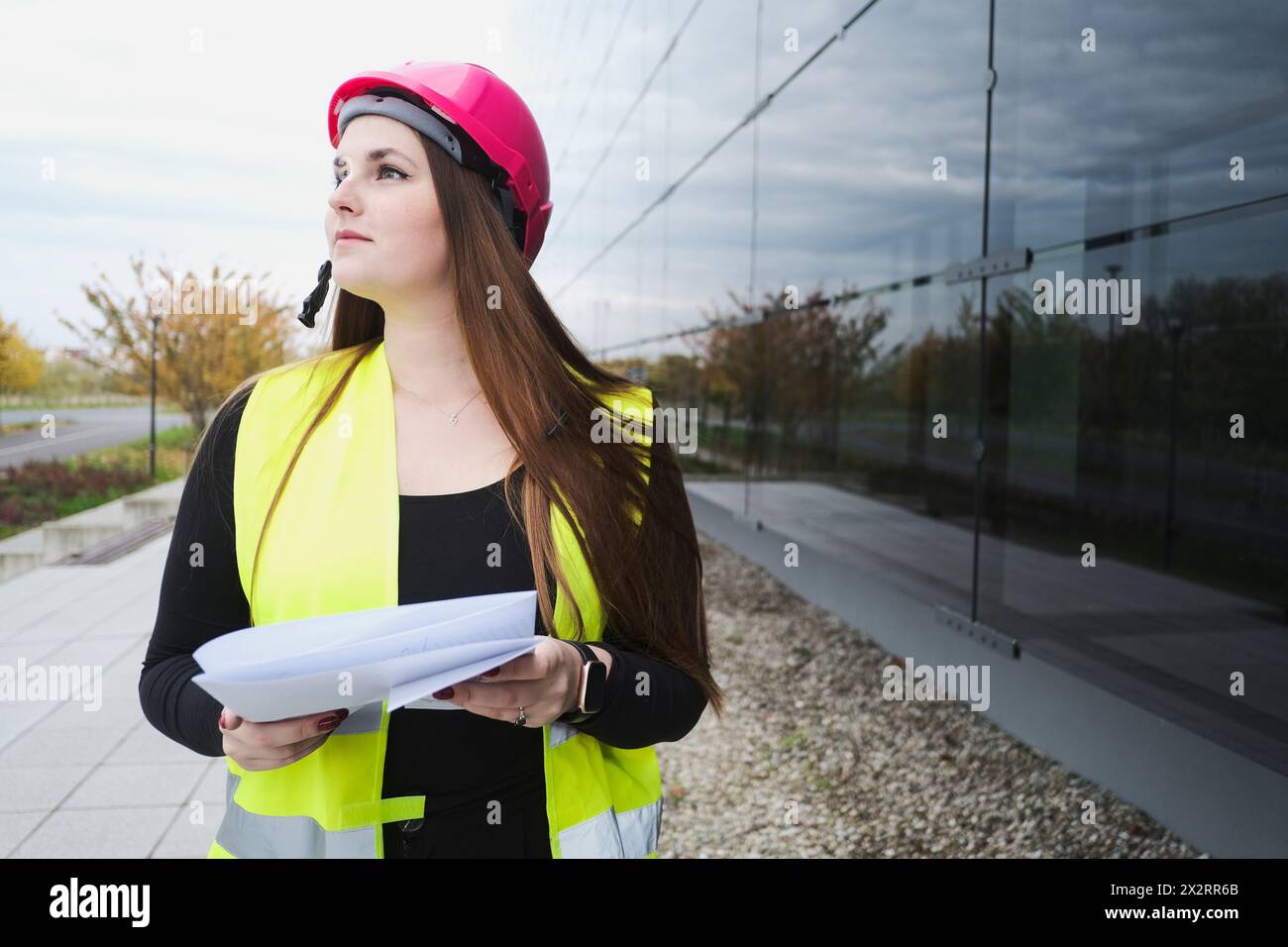Thoughtful architect holding documents hi-res stock photography and ...
