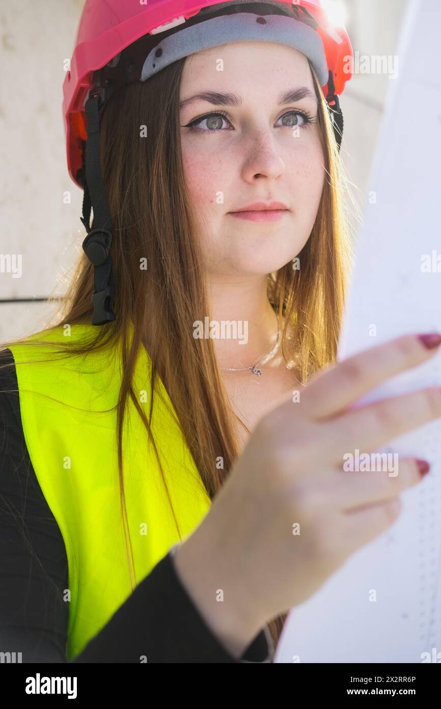 Focused woman reading document hi-res stock photography and images - Alamy