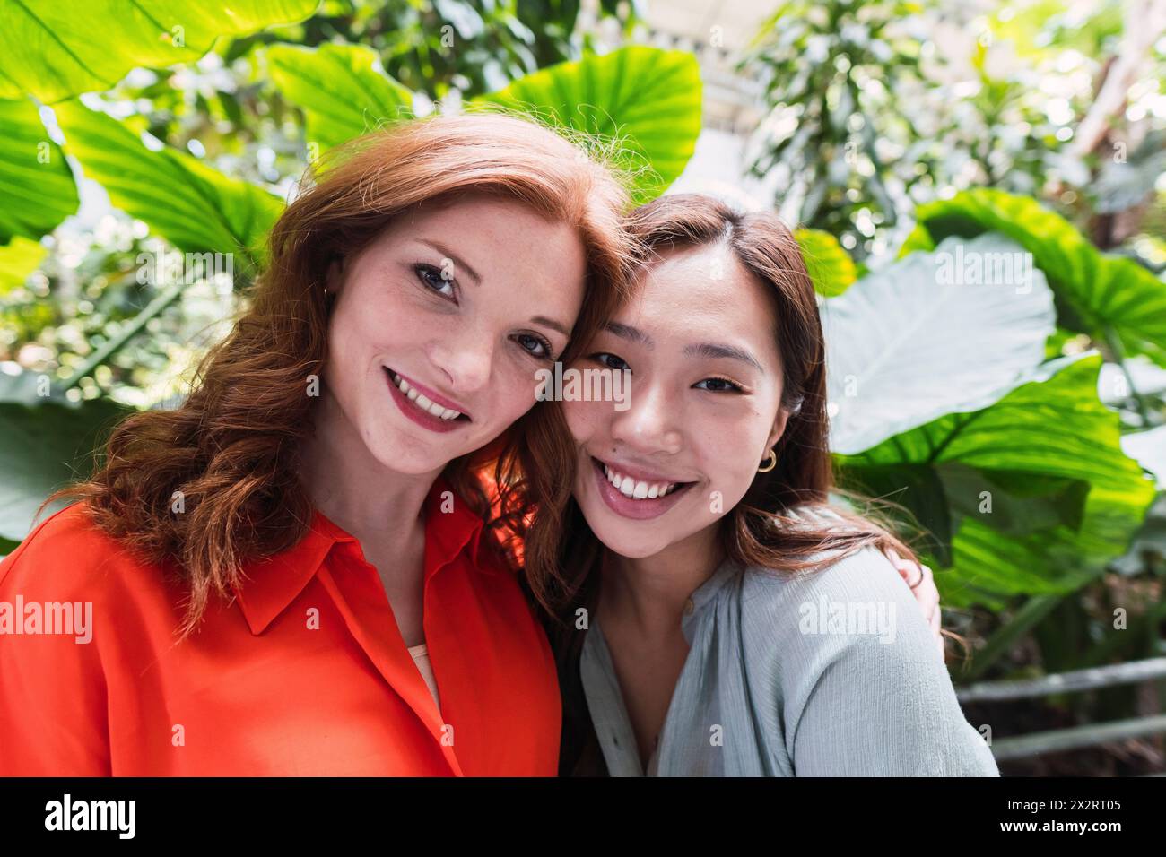 Portrait two happy female multiracial hi-res stock photography and ...