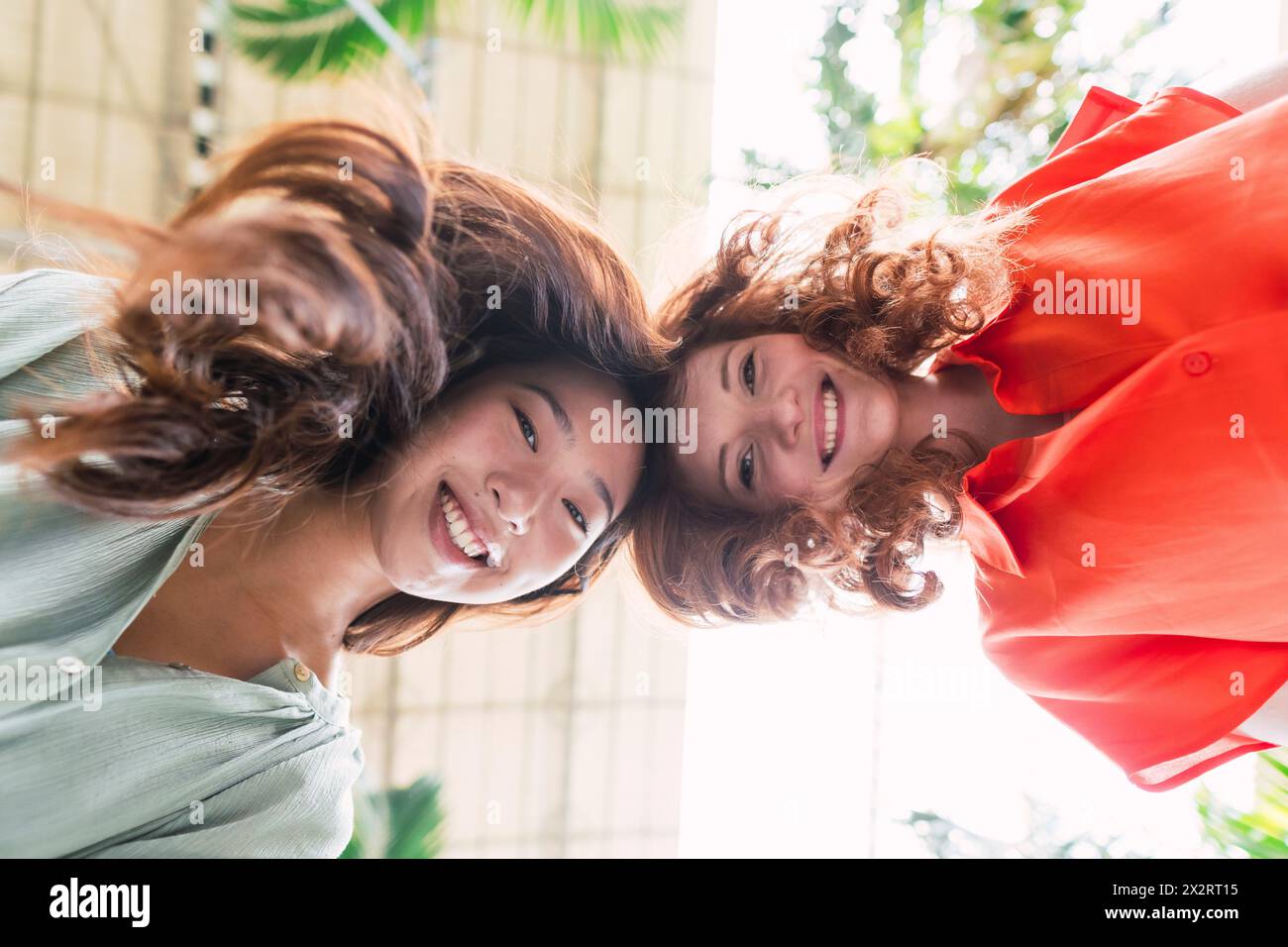 Heads touching hi-res stock photography and images - Alamy