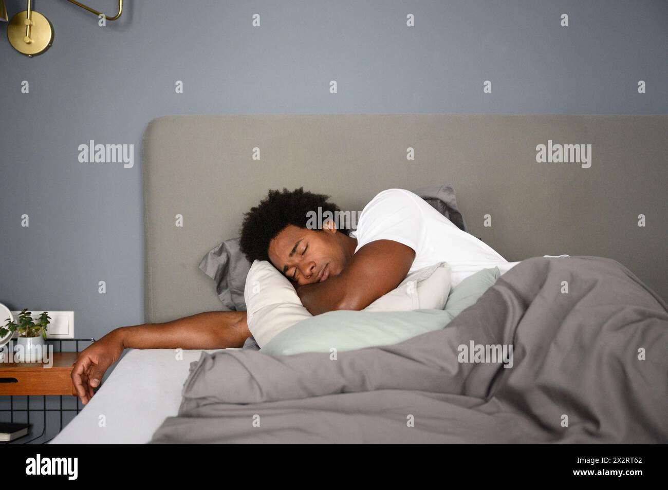 Man sleeping bed hi-res stock photography and images - Alamy