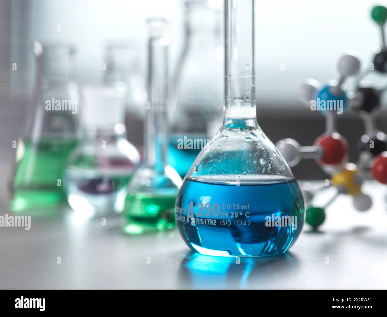 Glass flask blue chemistry hi-res stock photography and images - Alamy