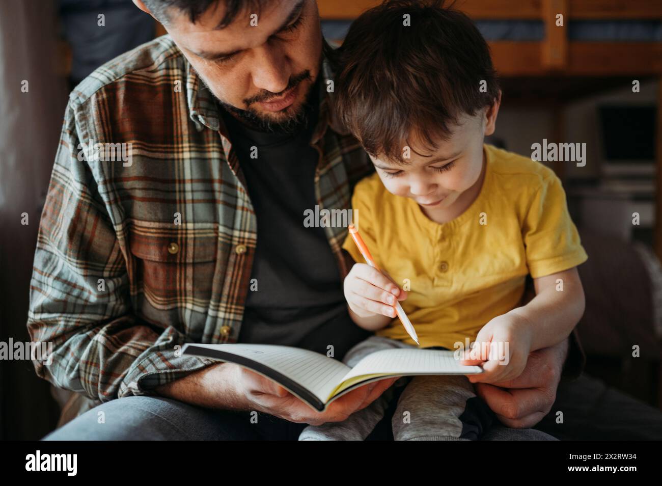Father and son studying hi-res stock photography and images - Alamy