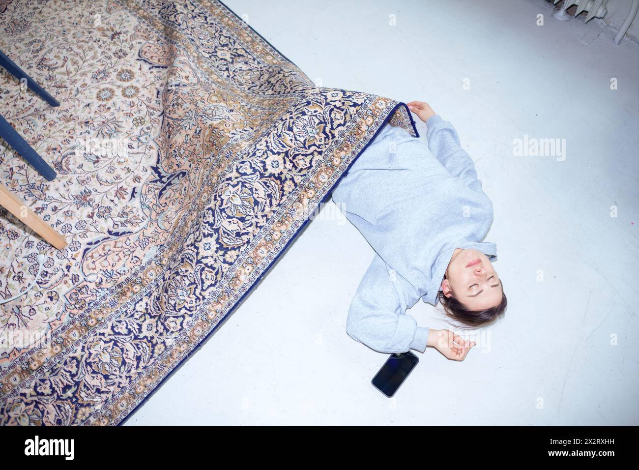 Sleeping woman carpet hi-res stock photography and images - Alamy