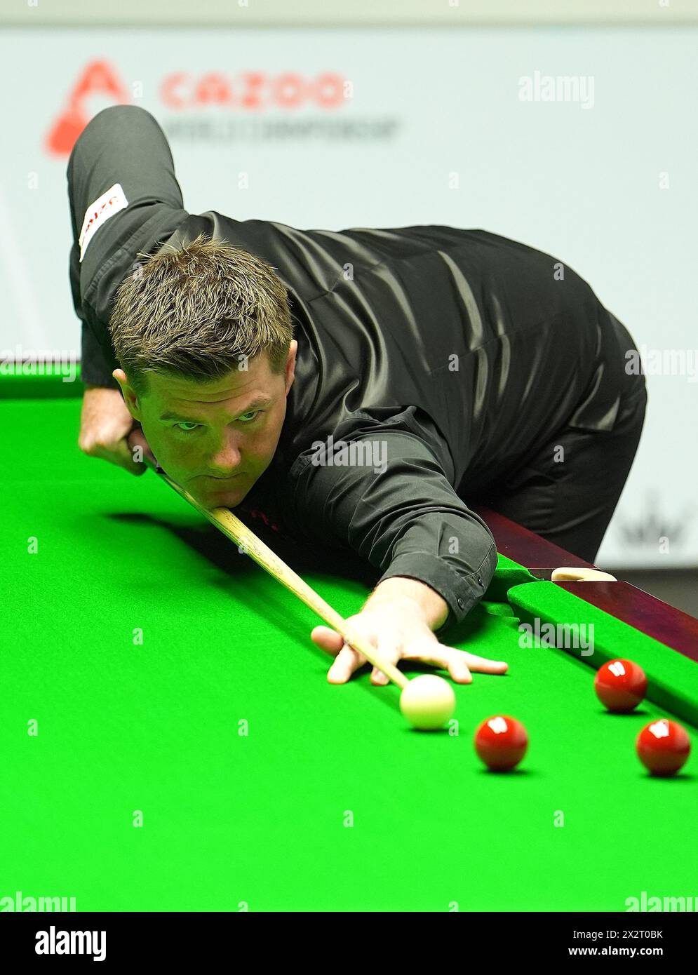 Ryan Day plays a shot during his match against Barry Hawkins on day ...