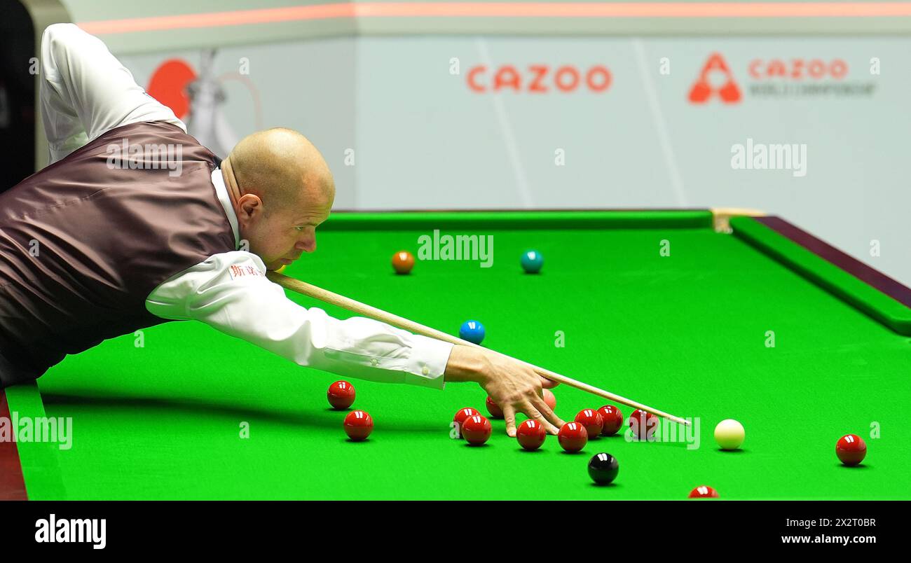 Barry Hawkins plays a shot during his match against Ryan Day on day ...