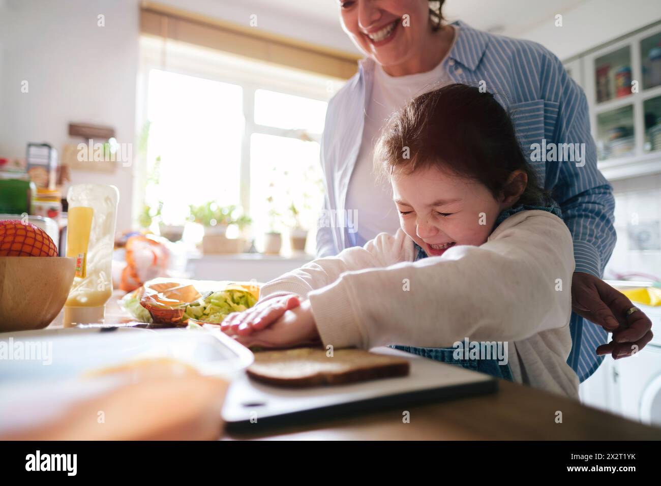 Girl preparing sandwich hi-res stock photography and images - Alamy