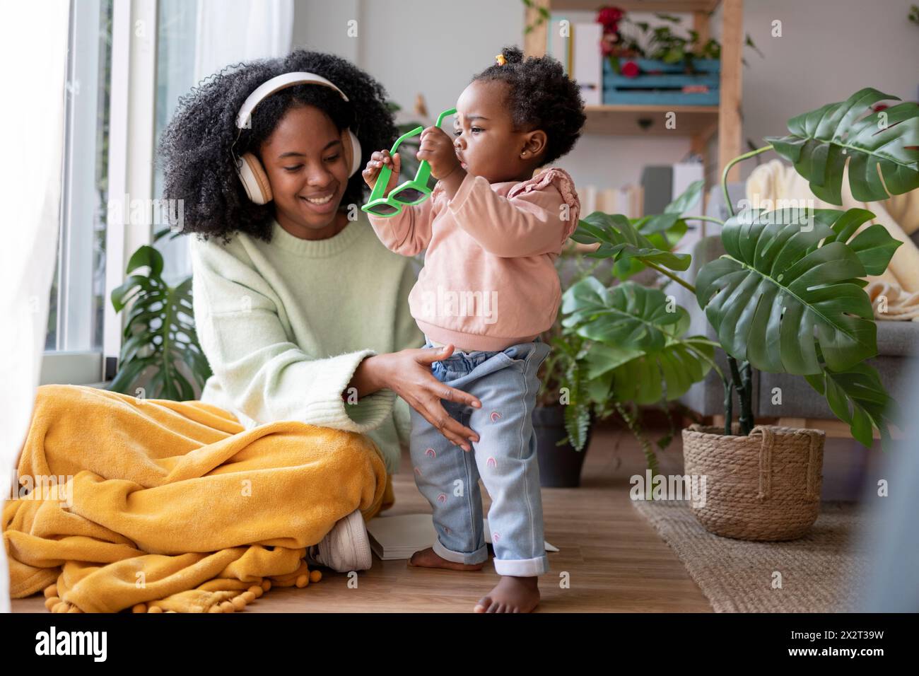 Daughter listening mother hi-res stock photography and images - Alamy