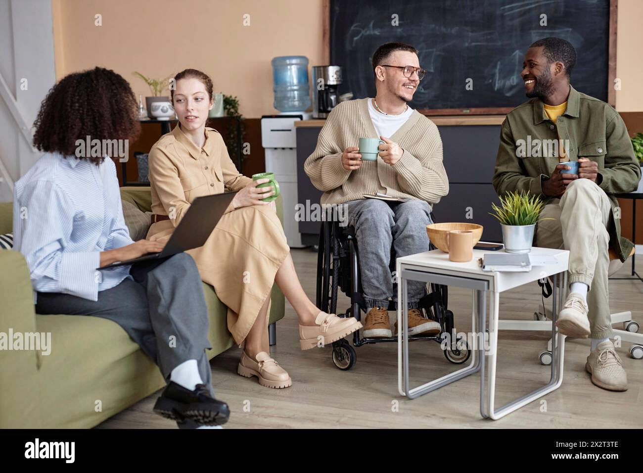 Happy multiracial business people having coffee break together in ...
