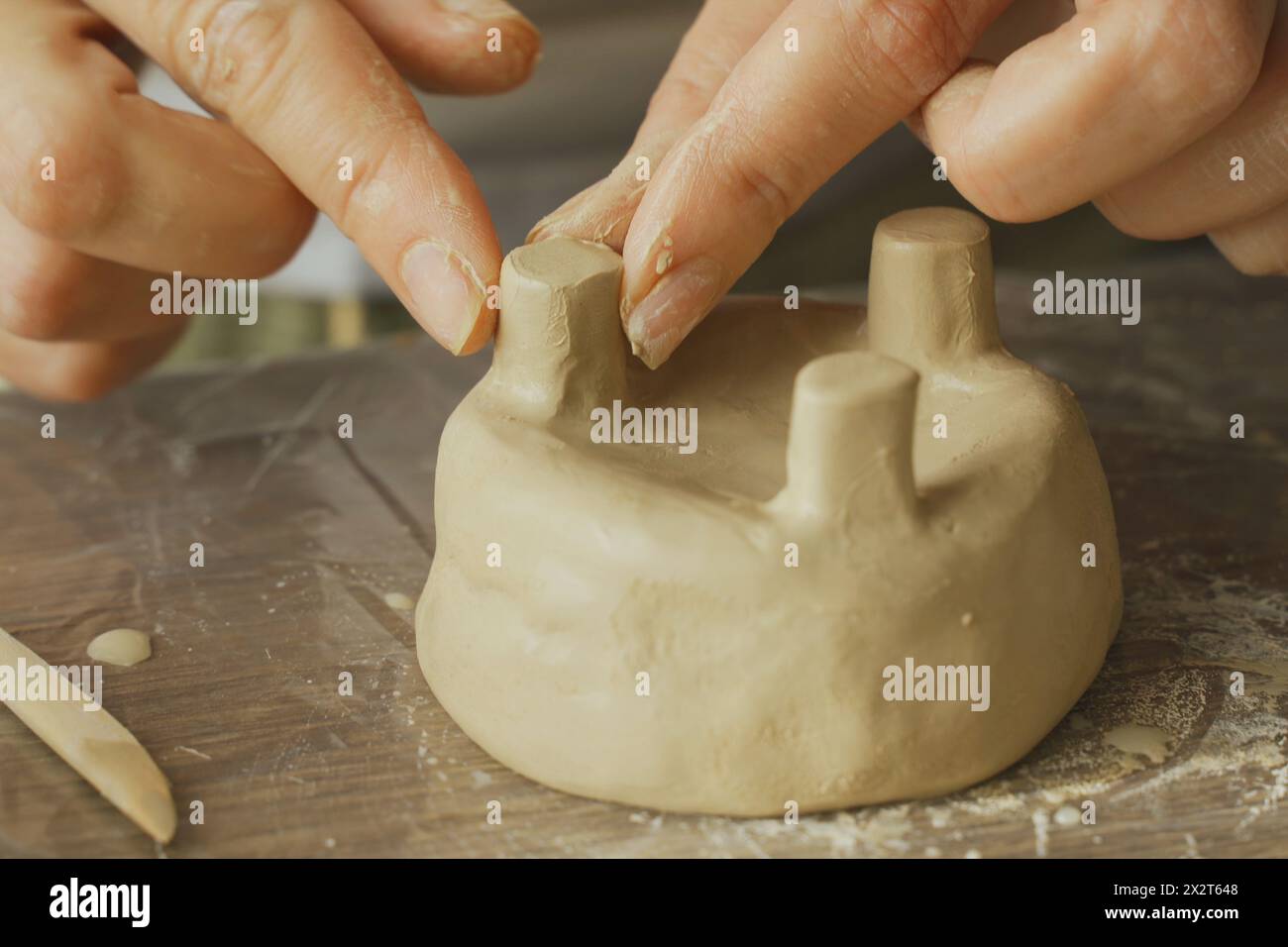 Creating create fashioning pottery hi-res stock photography and images ...