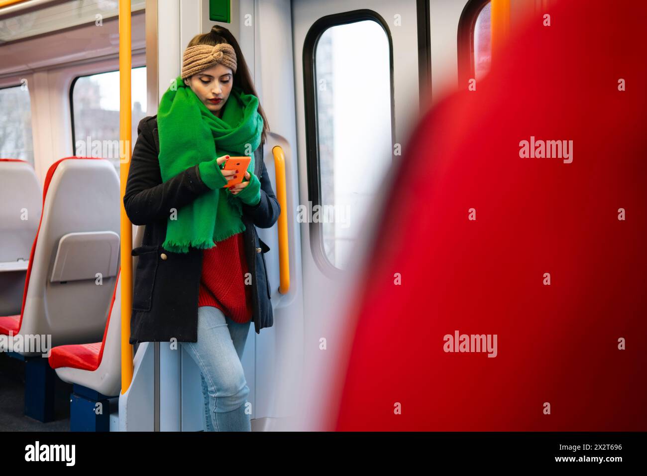 Female commuter on train using hi-res stock photography and images - Alamy