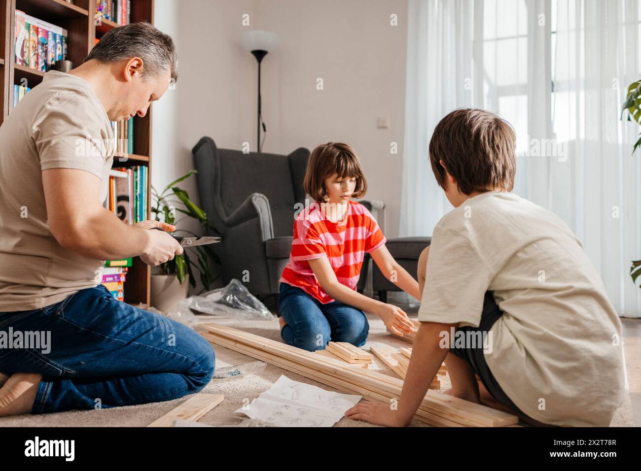 Children living room parent hi-res stock photography and images - Alamy