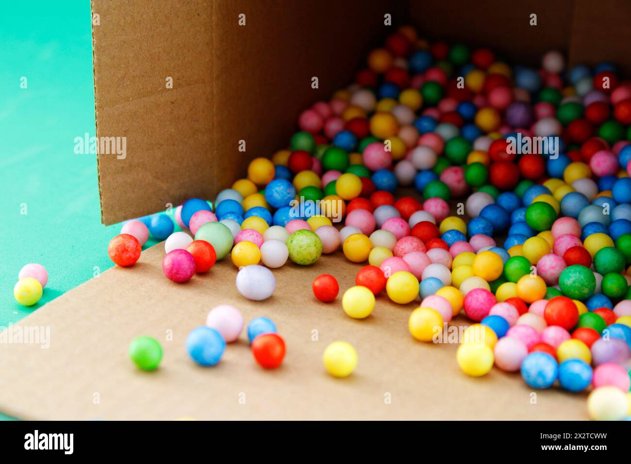 Packaging box with colorful spheres Stock Photo - Alamy