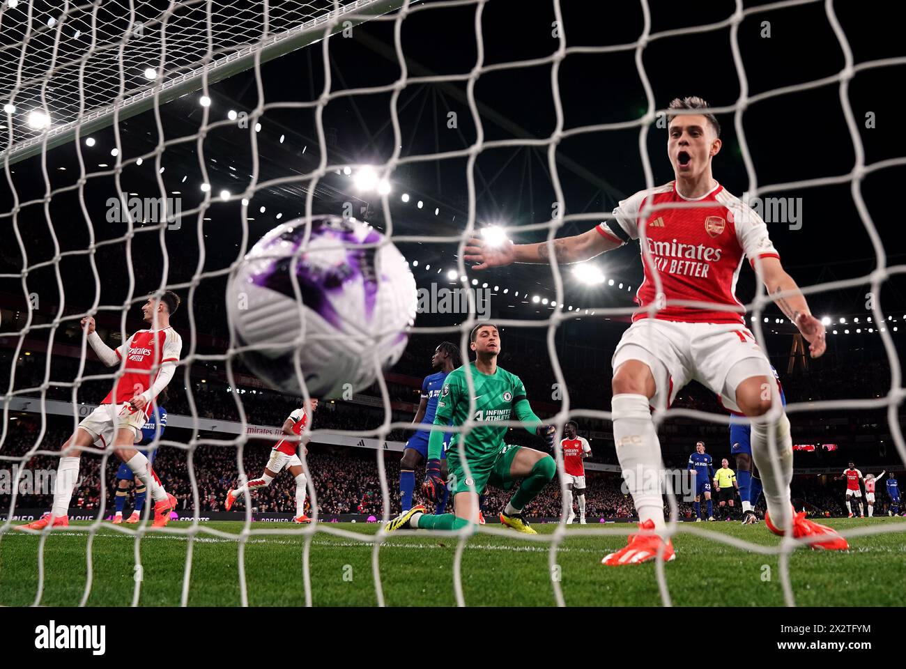 Arsenal's Leandro Trossard reacts after team-mate Ben White (centre ...
