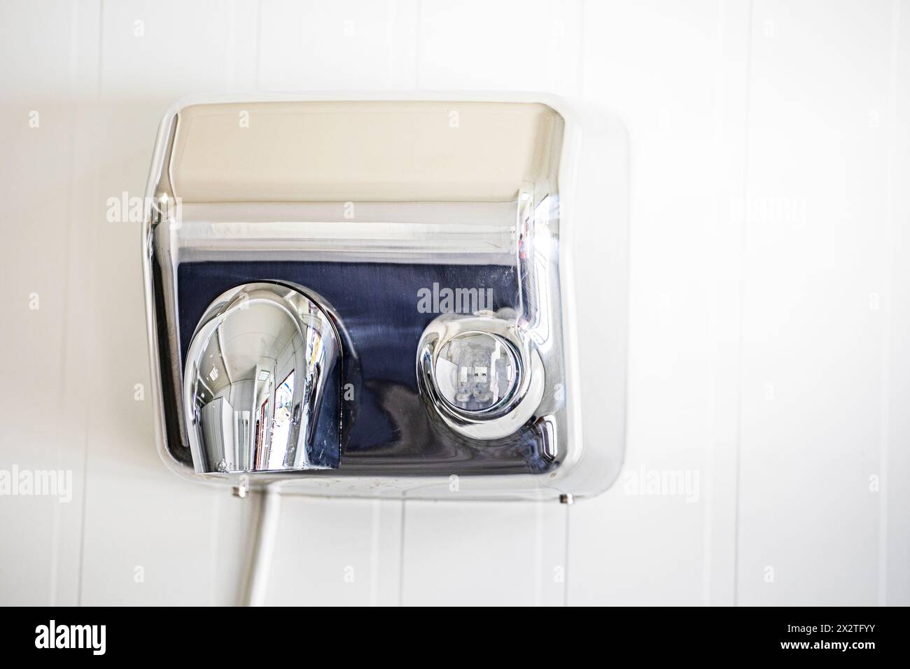 modern hand dryer in the toilet room. Modern Design Trends Stock Photo ...