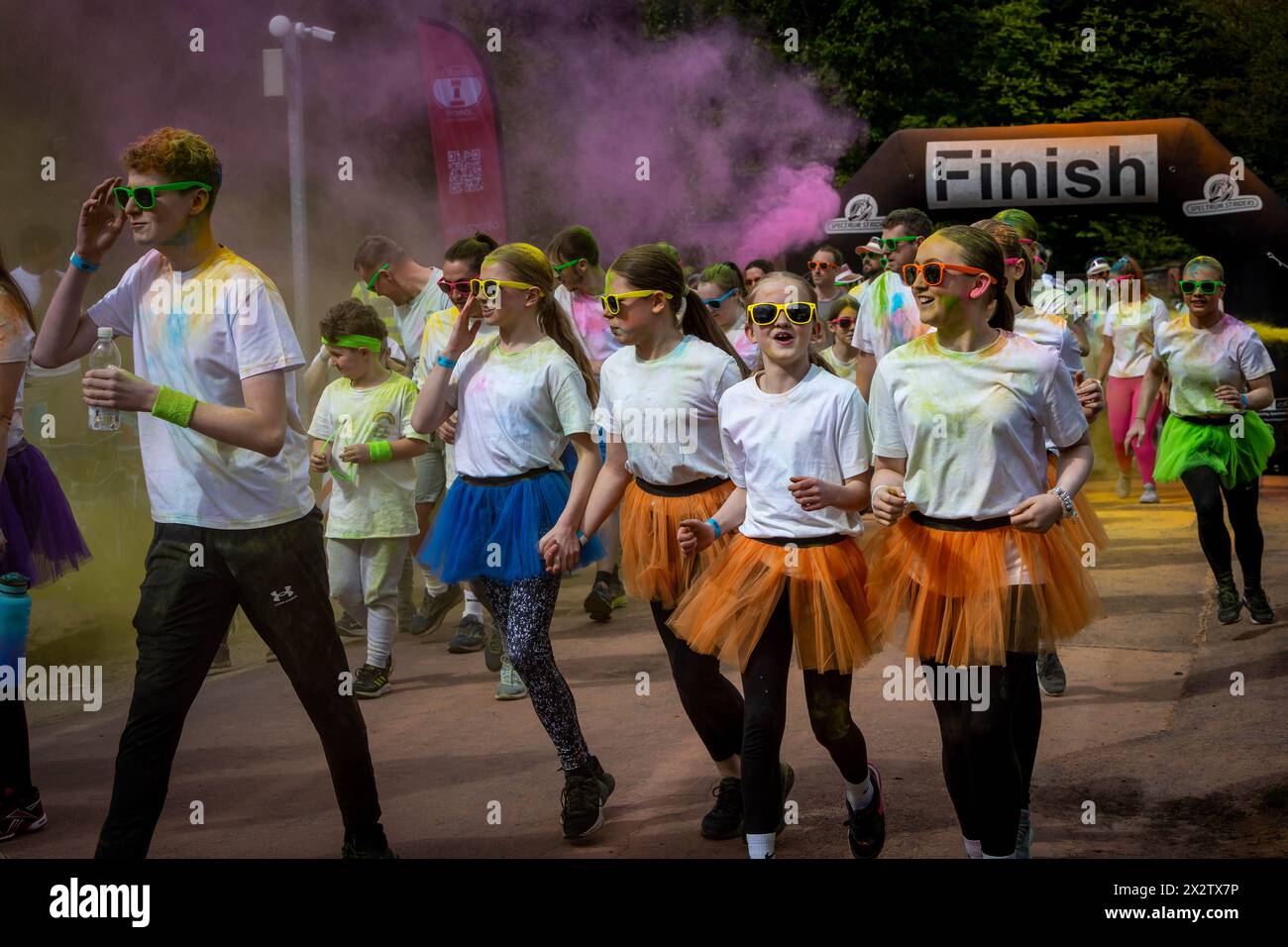 Families and girls in tutus begin the event at the Colour Run in aid of ...