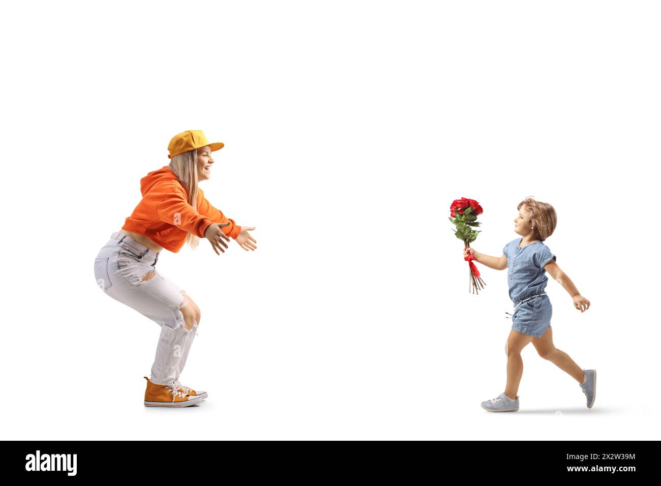 Full length profile shot of a little girl holding rosed and meeting a ...