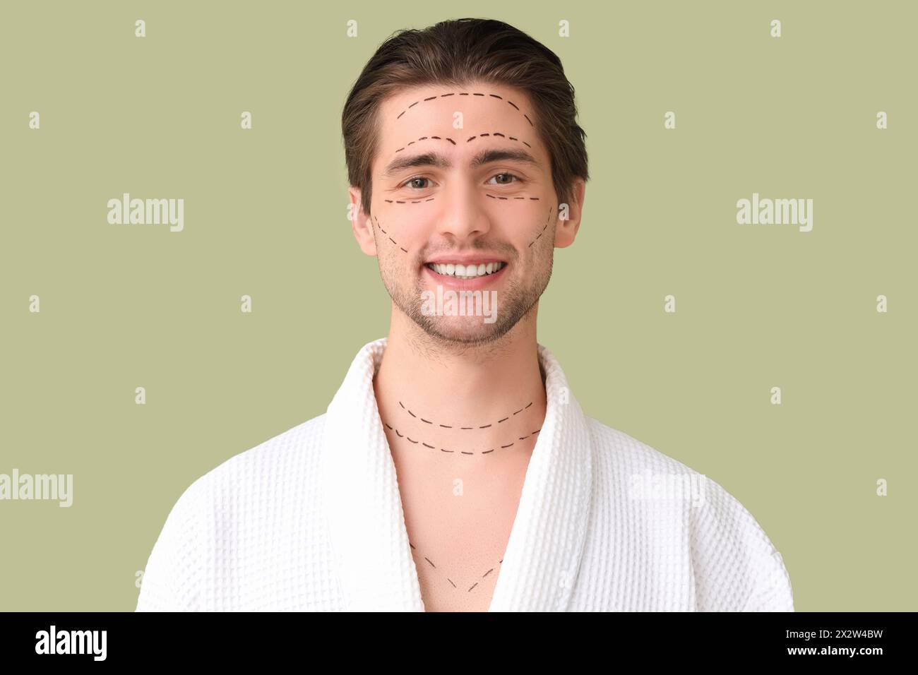 Smiling young man with marked face on green background, closeup ...