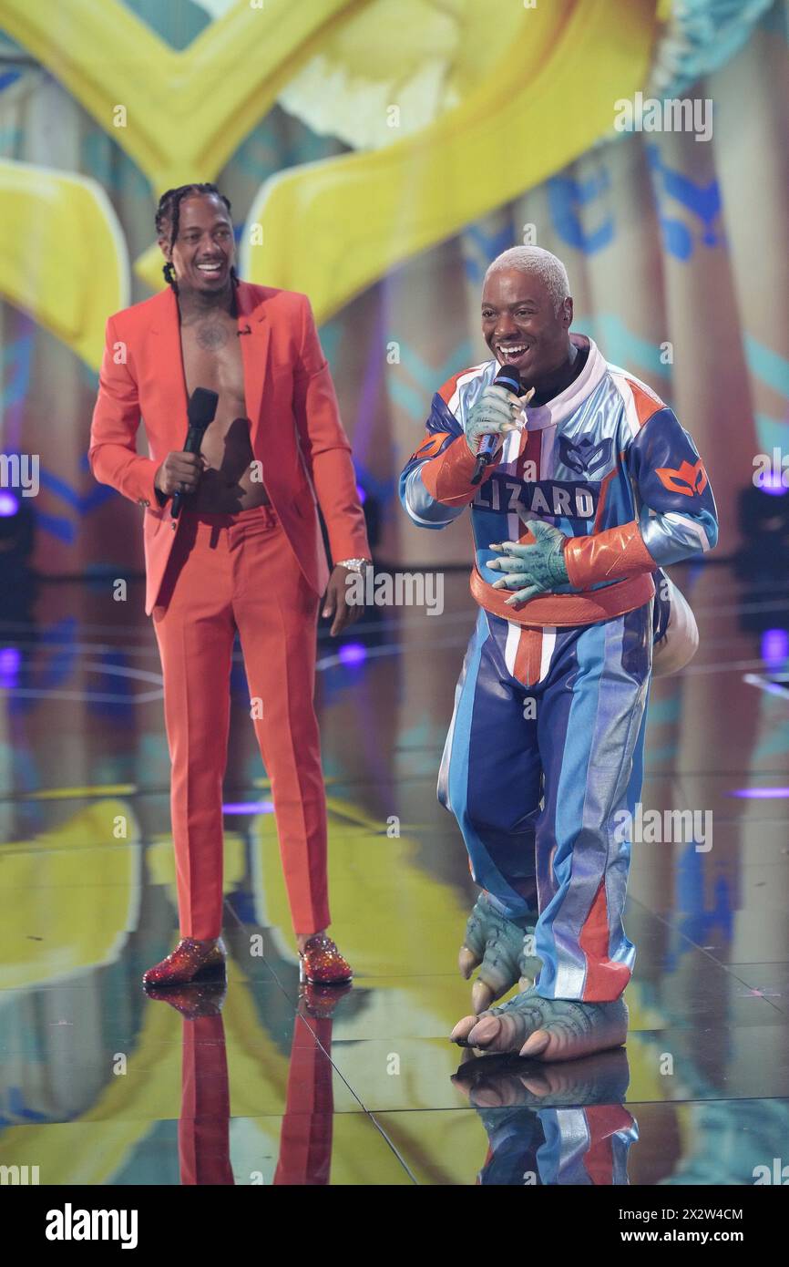 THE MASKED SINGER, from left: host Nick Cannon, Lizard (revealed as ...