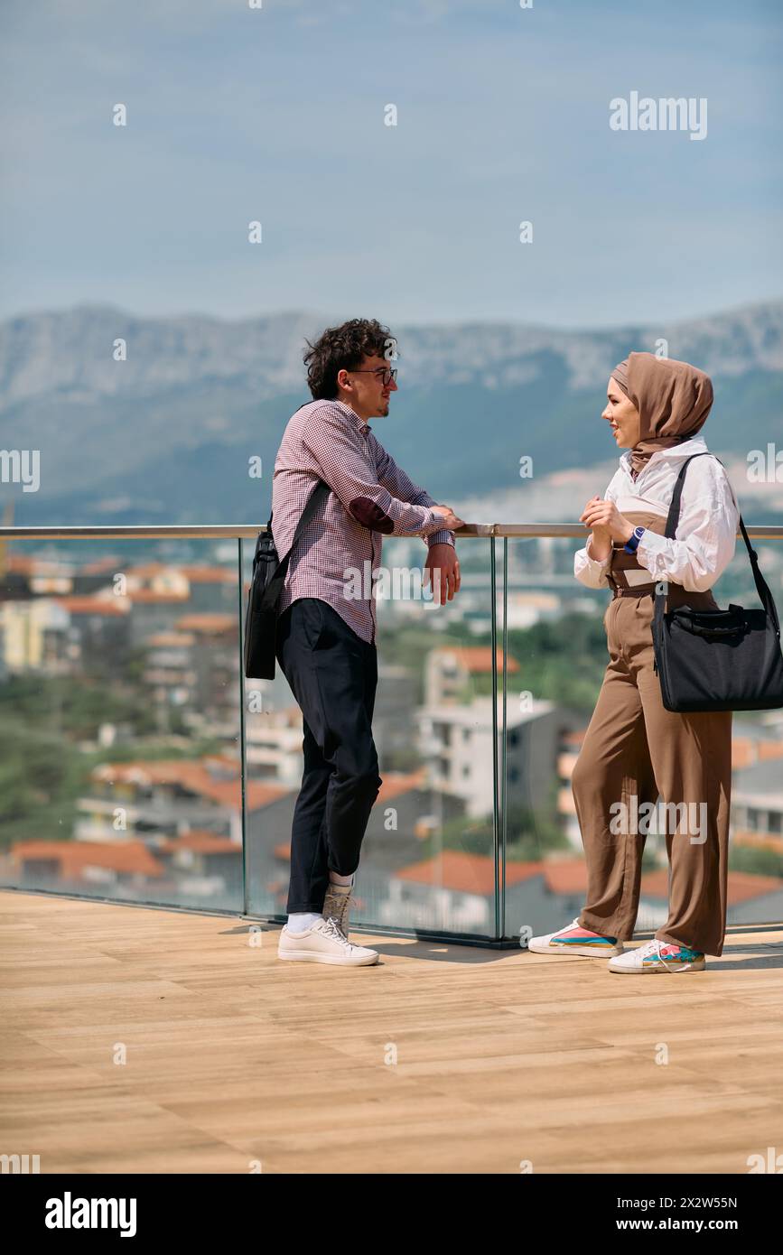 After a day at the office, a business man engages in conversation with ...