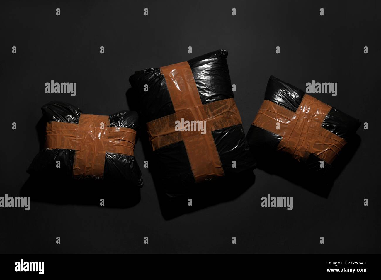 Drug packages on dark background Stock Photo - Alamy