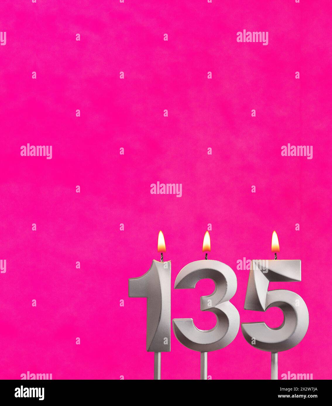 Candle number 135 - Birthday celebration on fuchsia background Stock ...