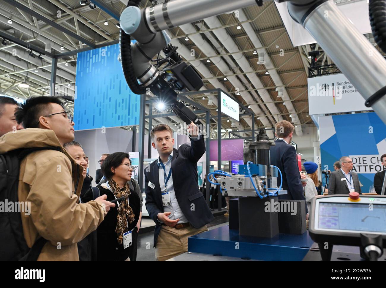 Hannover, Germany. 23rd Apr, 2024. People look at an intelligent ...