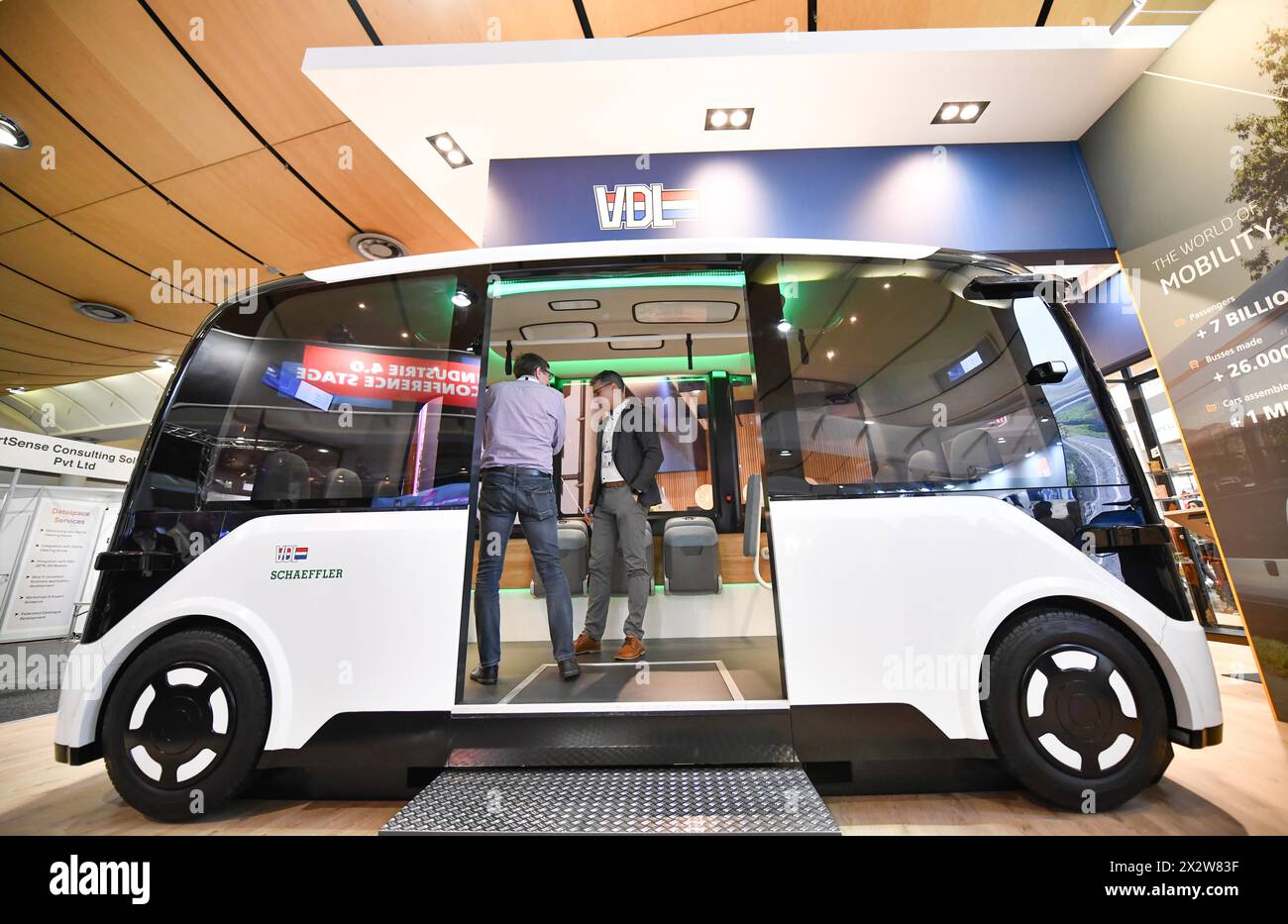 Hannover, Germany. 23rd Apr, 2024. People look at a self-driving ...