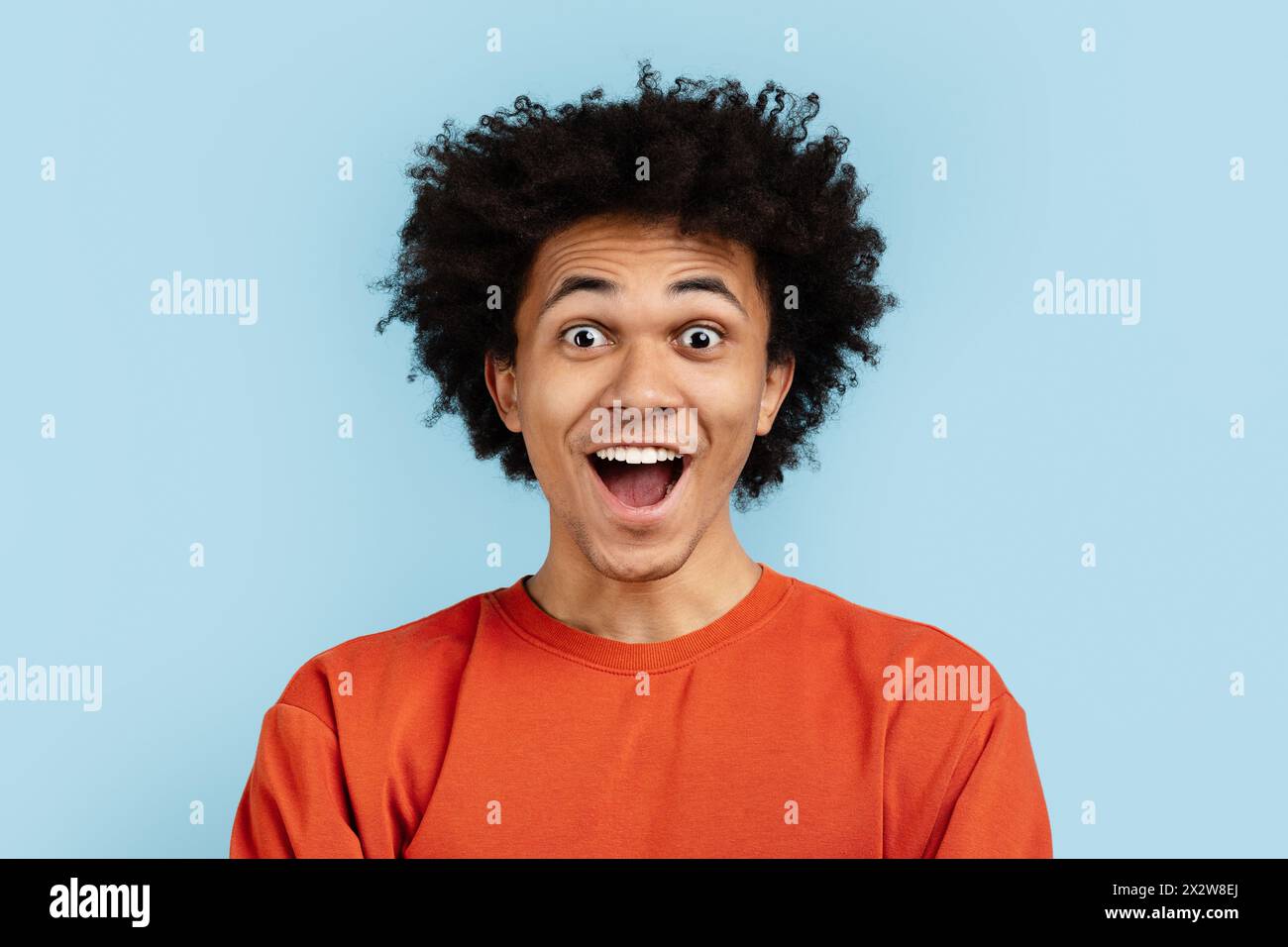 Joyful african american man with a big laugh Stock Photo - Alamy