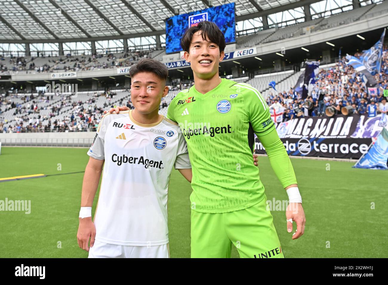 Tokyo, Japan. 21st Apr, 2024. FC Machida Zelvia's Zento Uno, left, and Kosei Tani celebrate ...