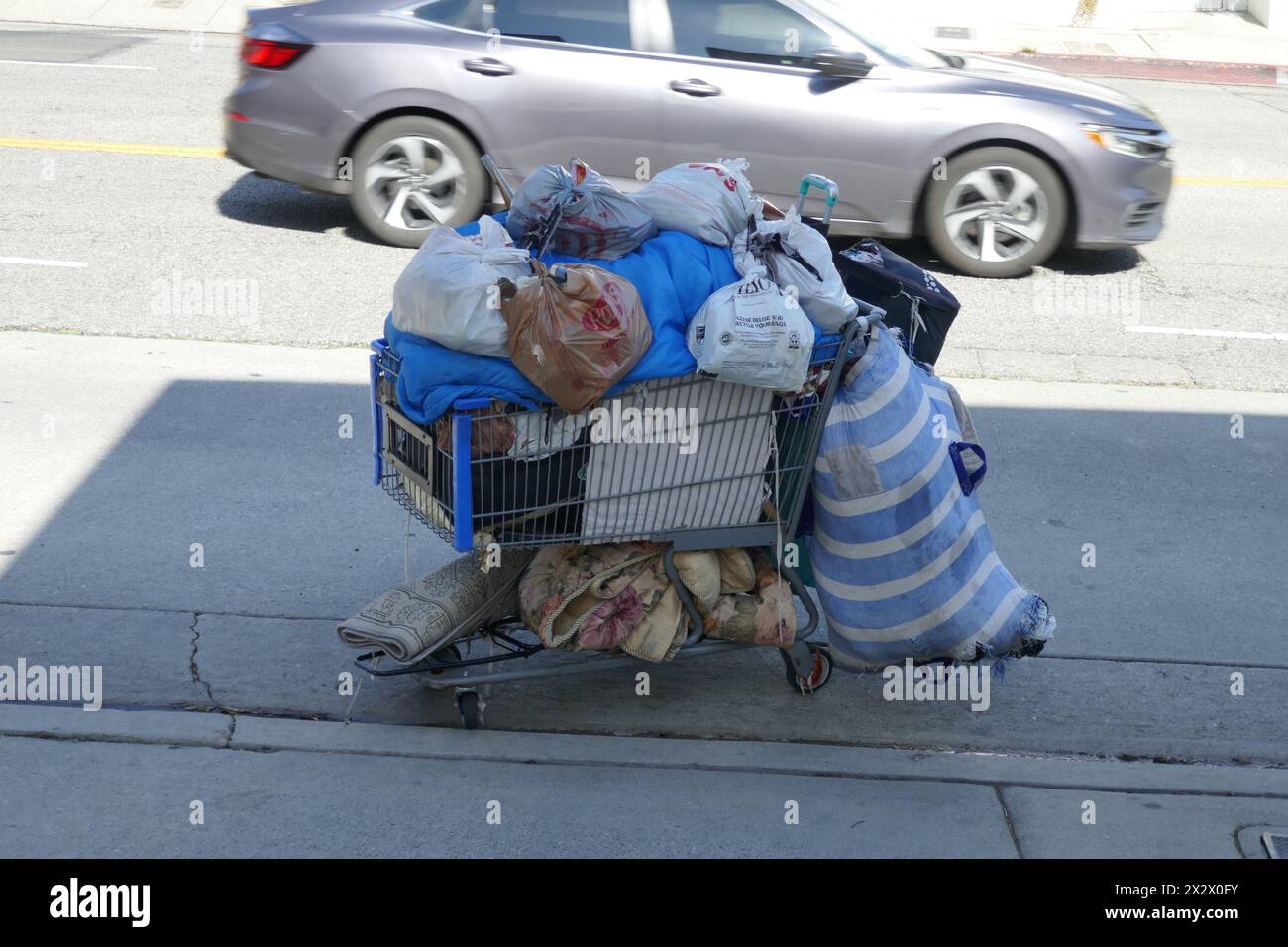 Los Angeles, California, USA 23rd April 2024 Homeless Shopping Cart on ...