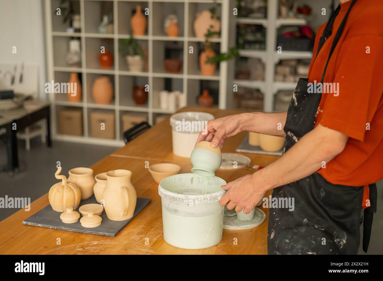 Pottery making glazing hi-res stock photography and images - Alamy