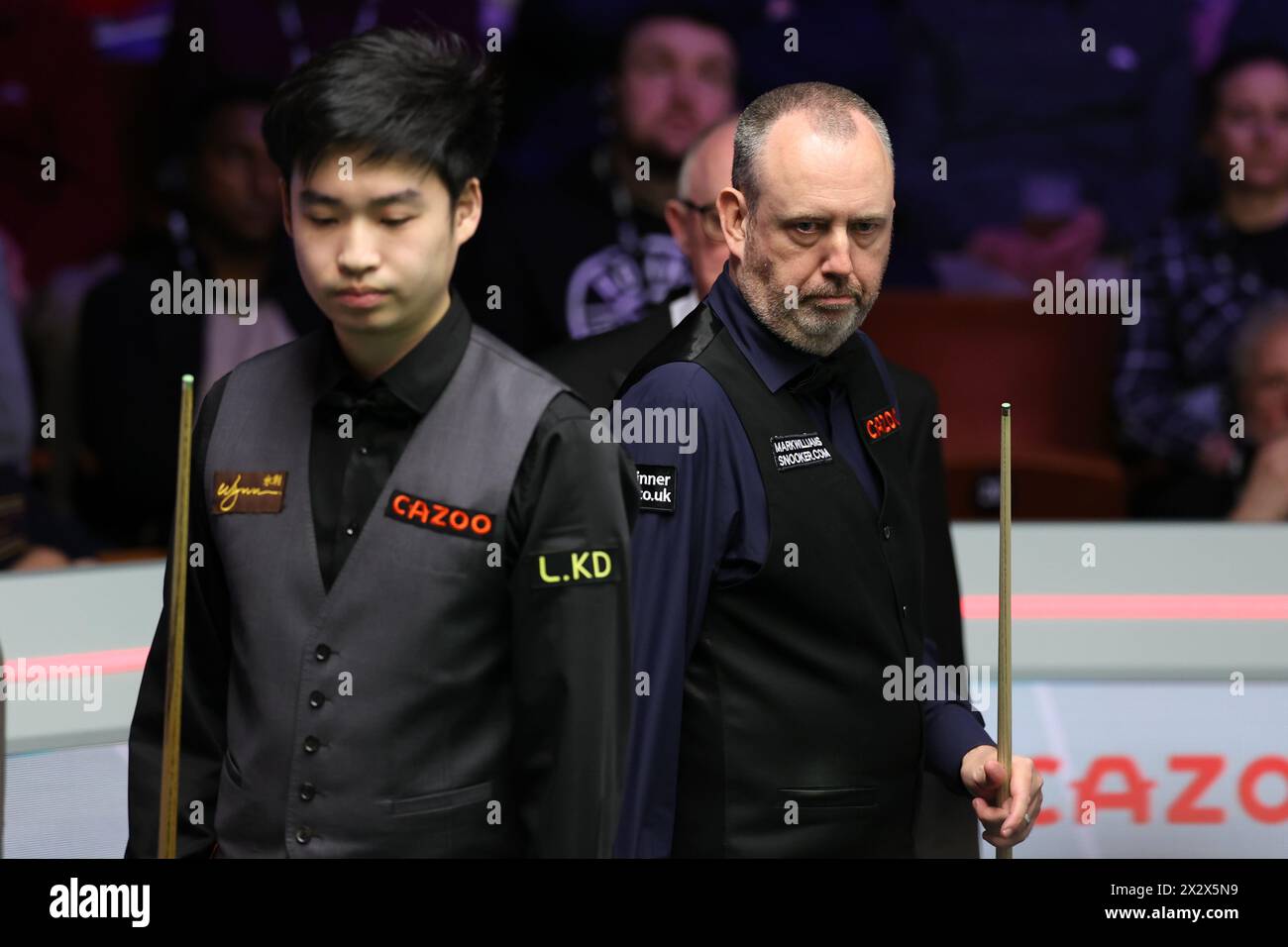 Sheffield, Britain. 23rd Apr, 2024. Mark Williams (R) of Wales and Si ...