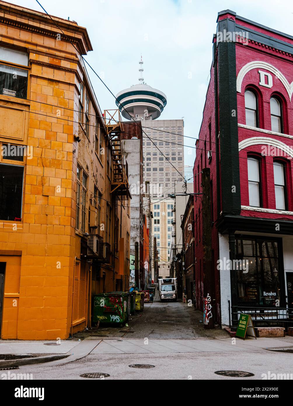 A view of the alley between two colorful heritage buildings on Cambie ...