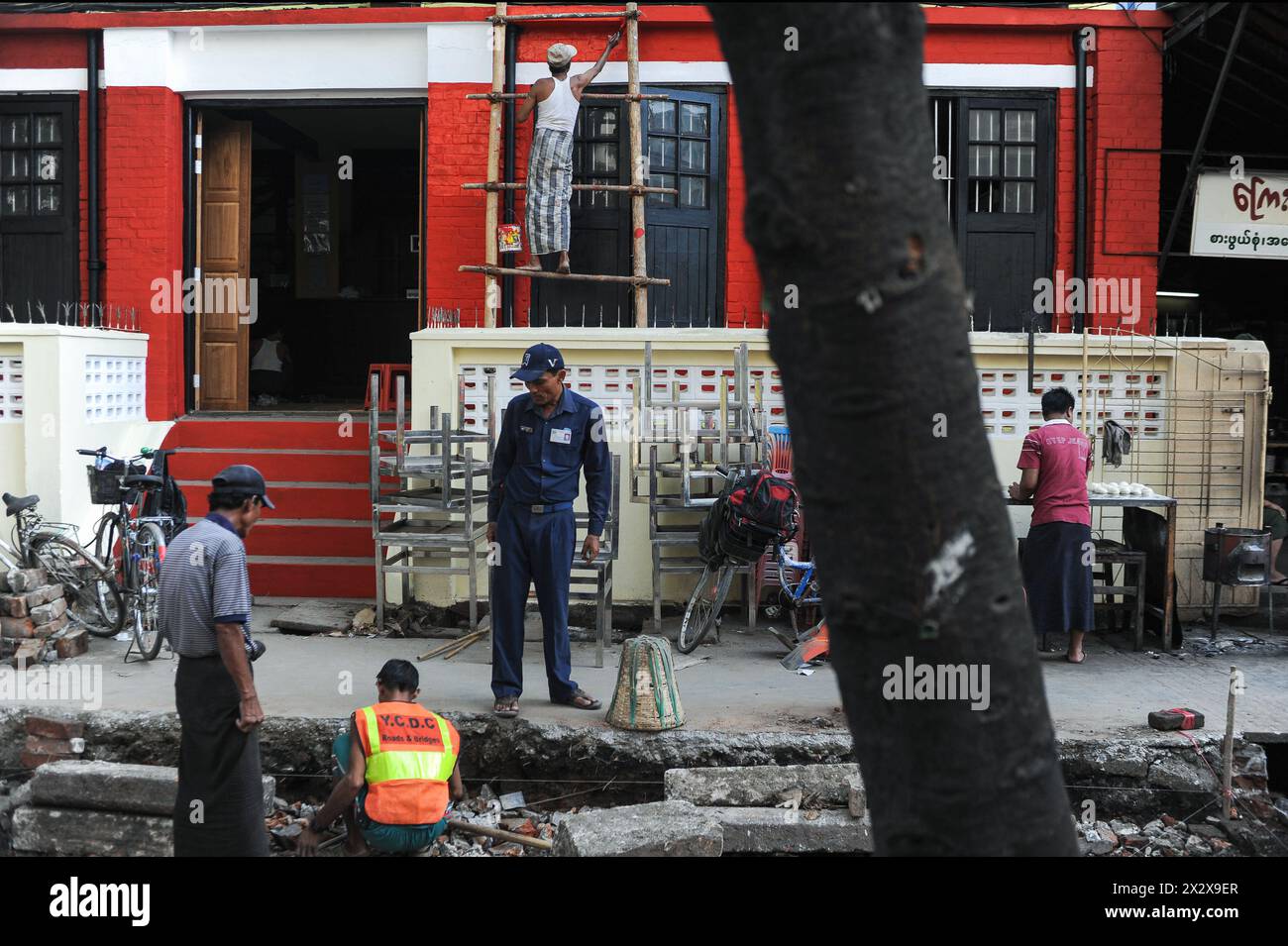22.02.2014, Yangon, , Myanmar - Workers doing construction work on a ...