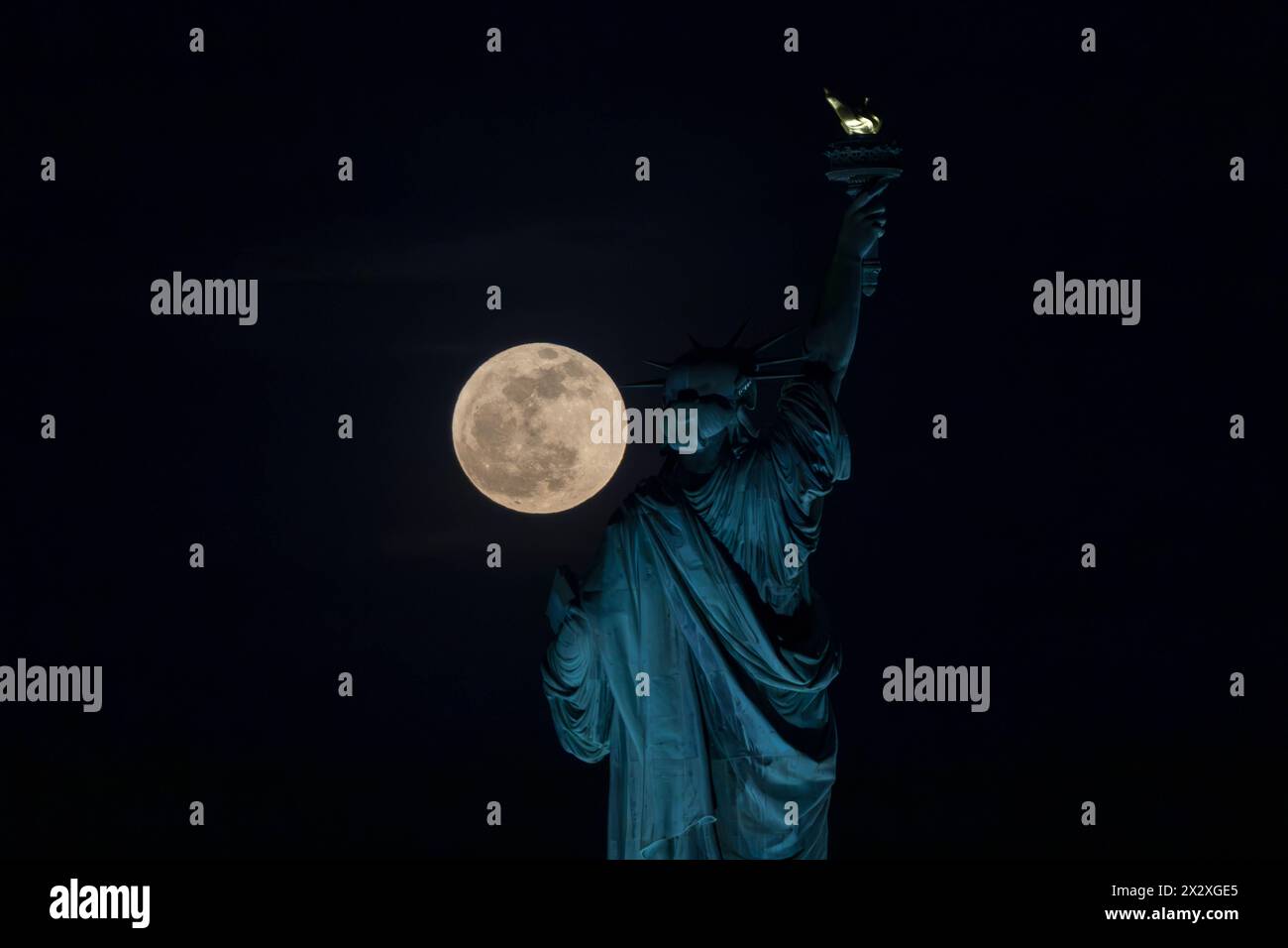 Jersey City, United State. 23rd Apr, 2024. The Pink Moon, illuminated ...