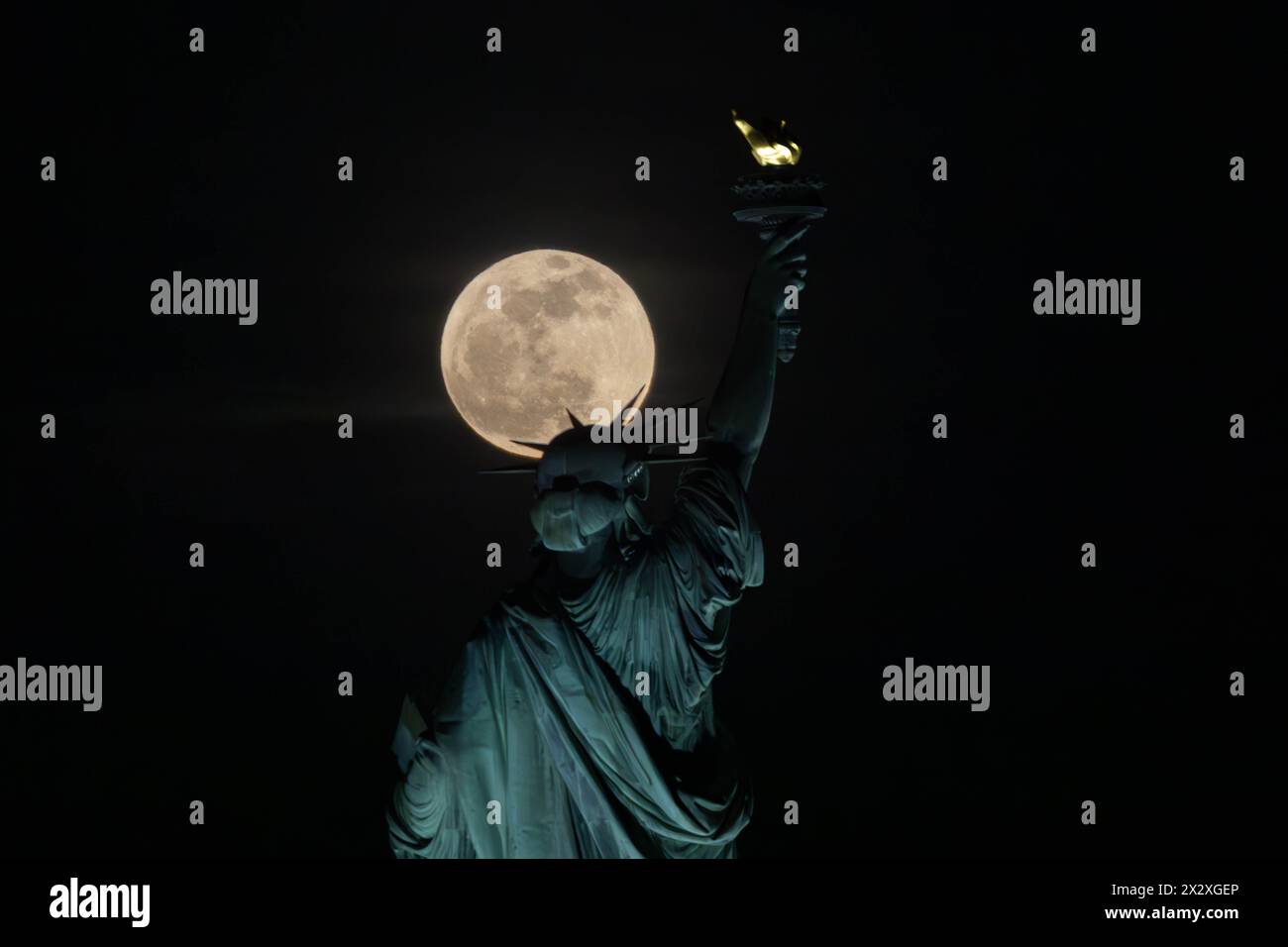 Jersey City, United State. 23rd Apr, 2024. The Pink Moon, illuminated ...