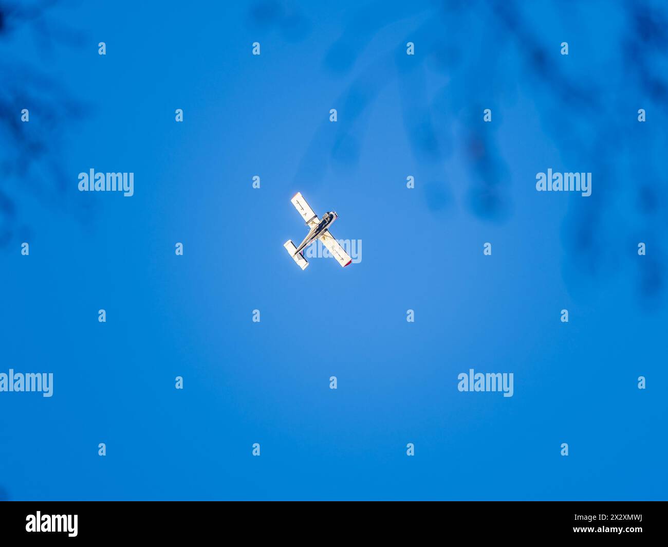 Small ultralight airplane with overhead wing and single propeller ...