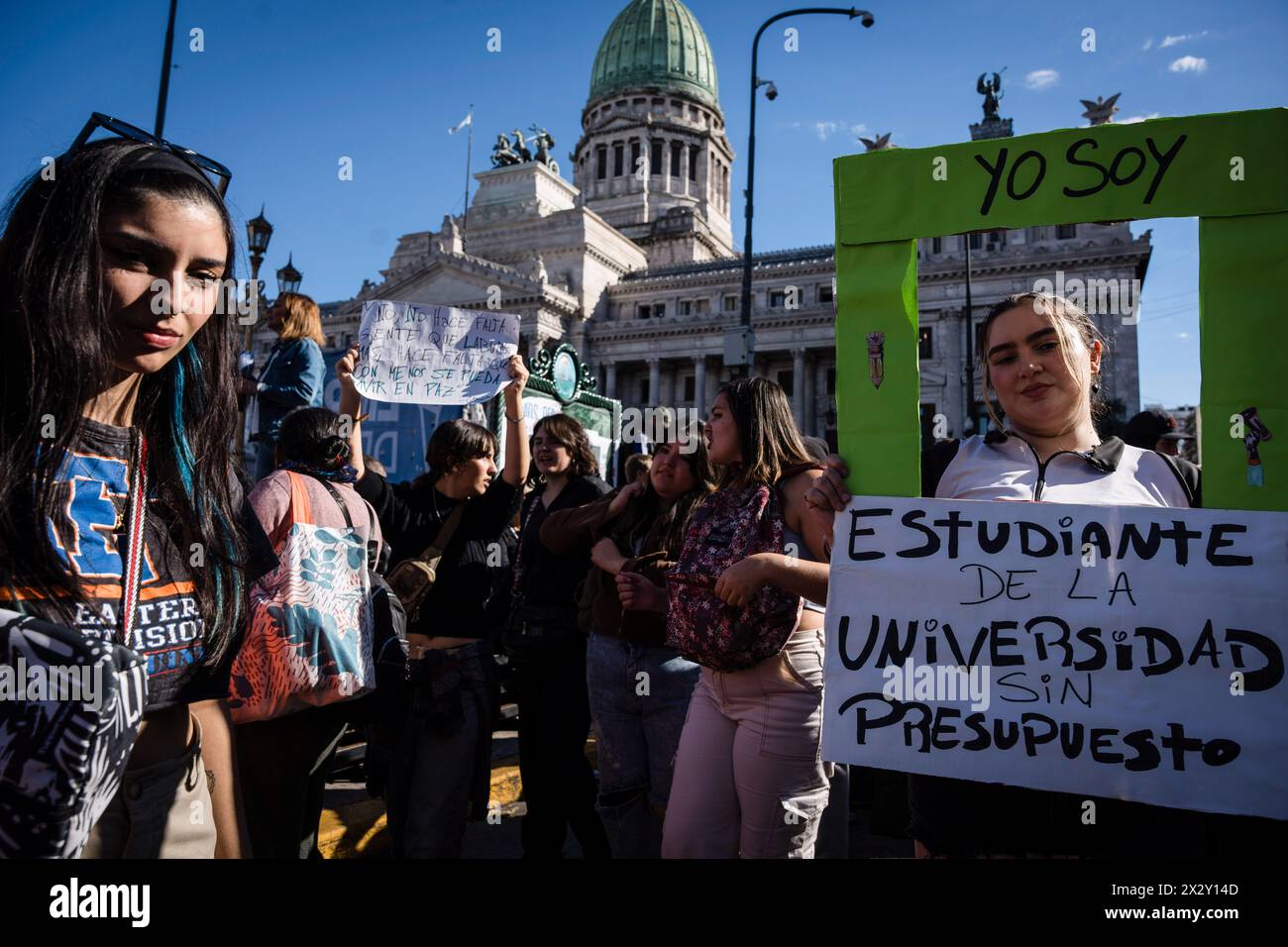 Buenos Aires, Argentina. 23rd Apr, 2024. Protesters hold placards ...