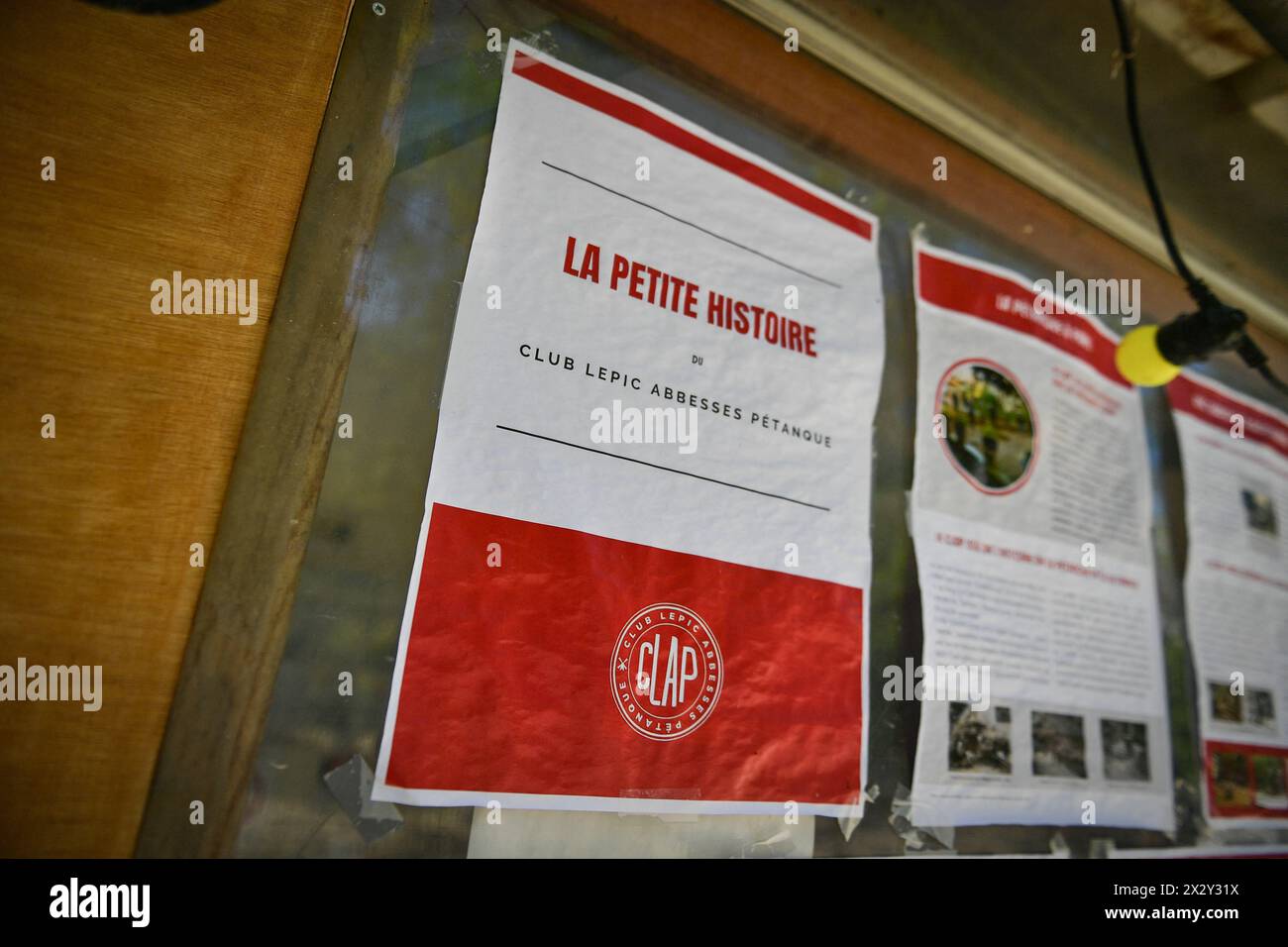 This photograph shows announcements at the Lepic Abbesses Petanque Club ...
