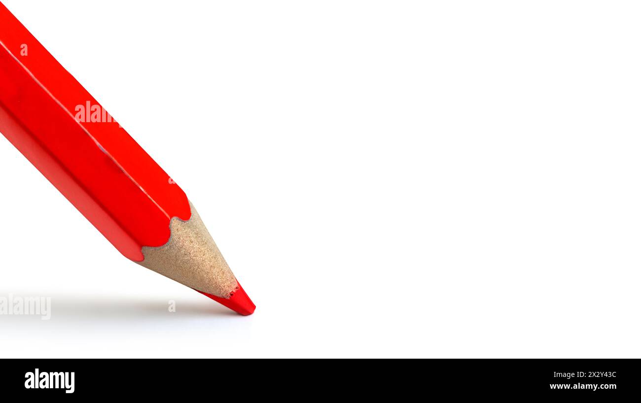 Upright red pencil with shadow isolated on white paper background, used ...