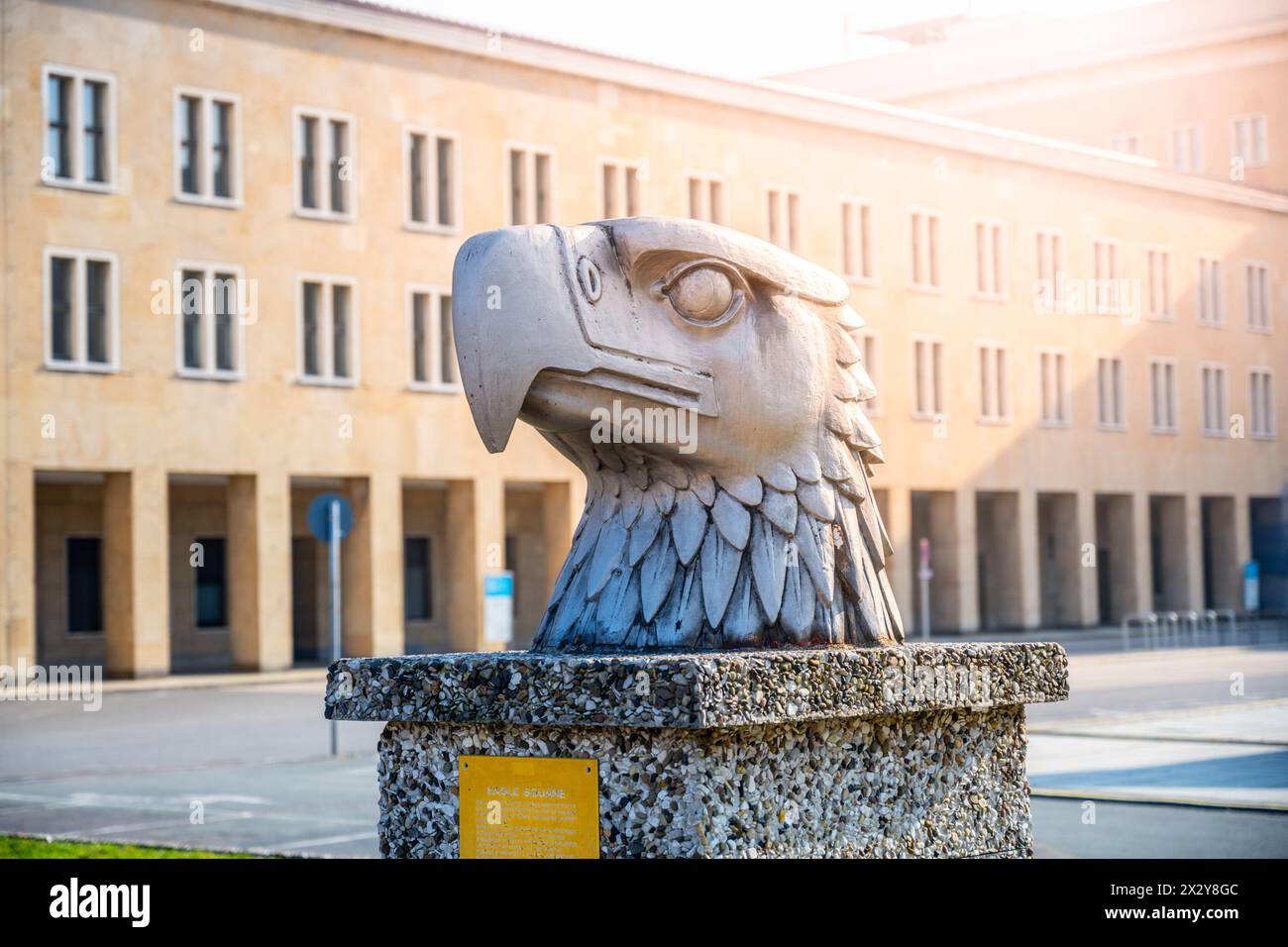 A detailed sculpture of an eagles head by Wilhelm Lemke, set against ...
