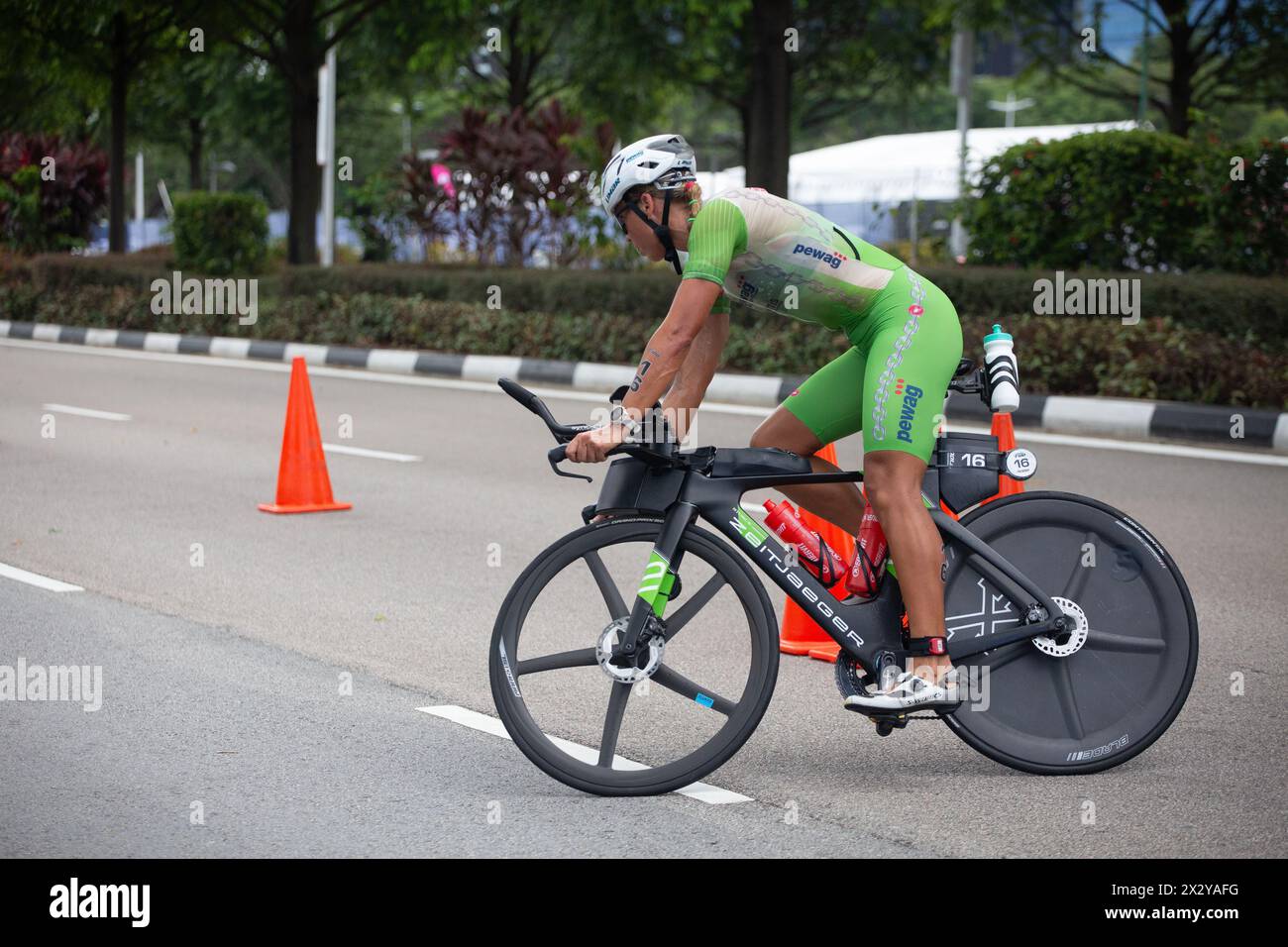13 April 2024. T100 triathlon event of female athletic on her sporty ...