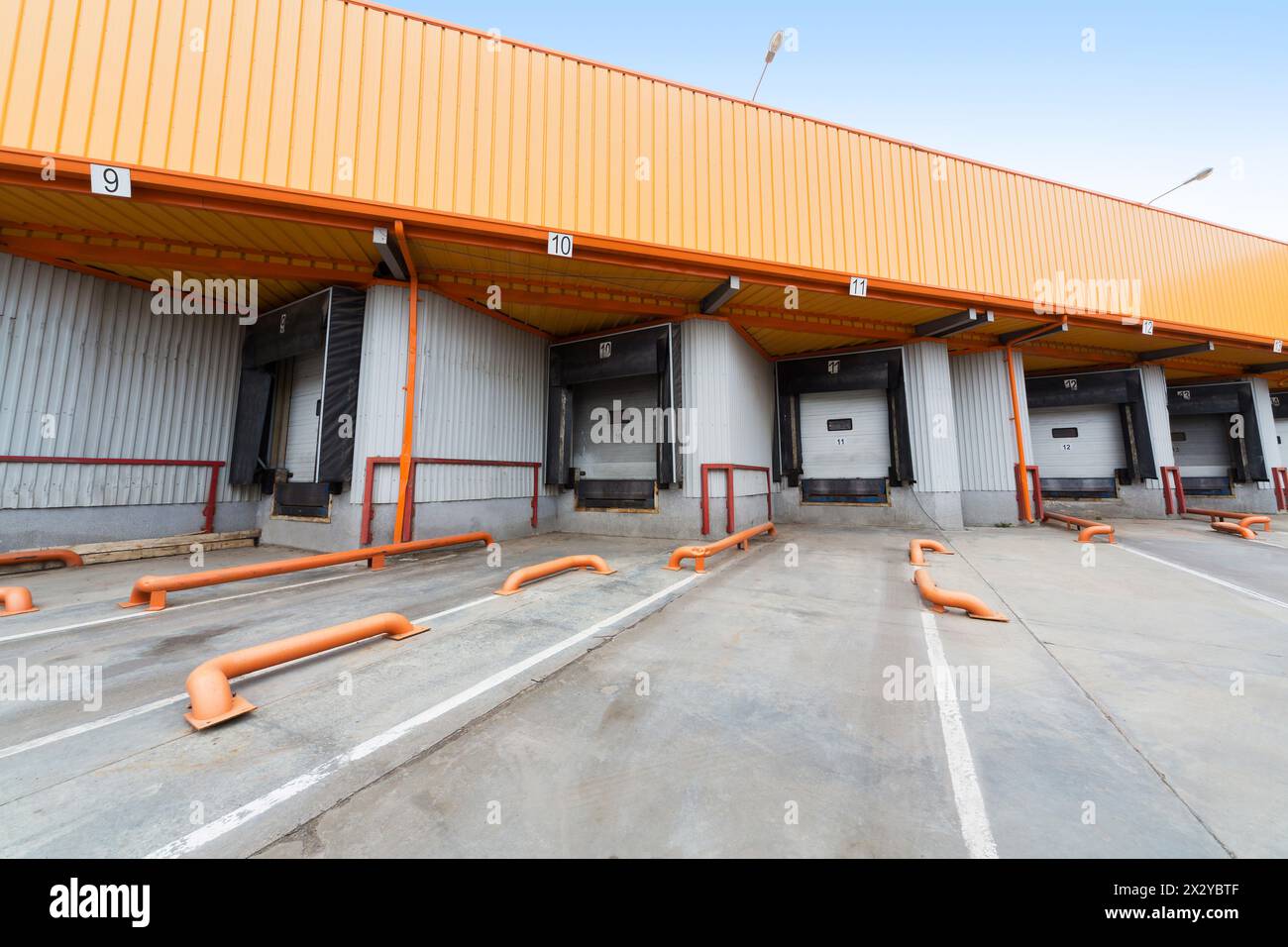 The gate to load goods on a large warehouse Stock Photo - Alamy