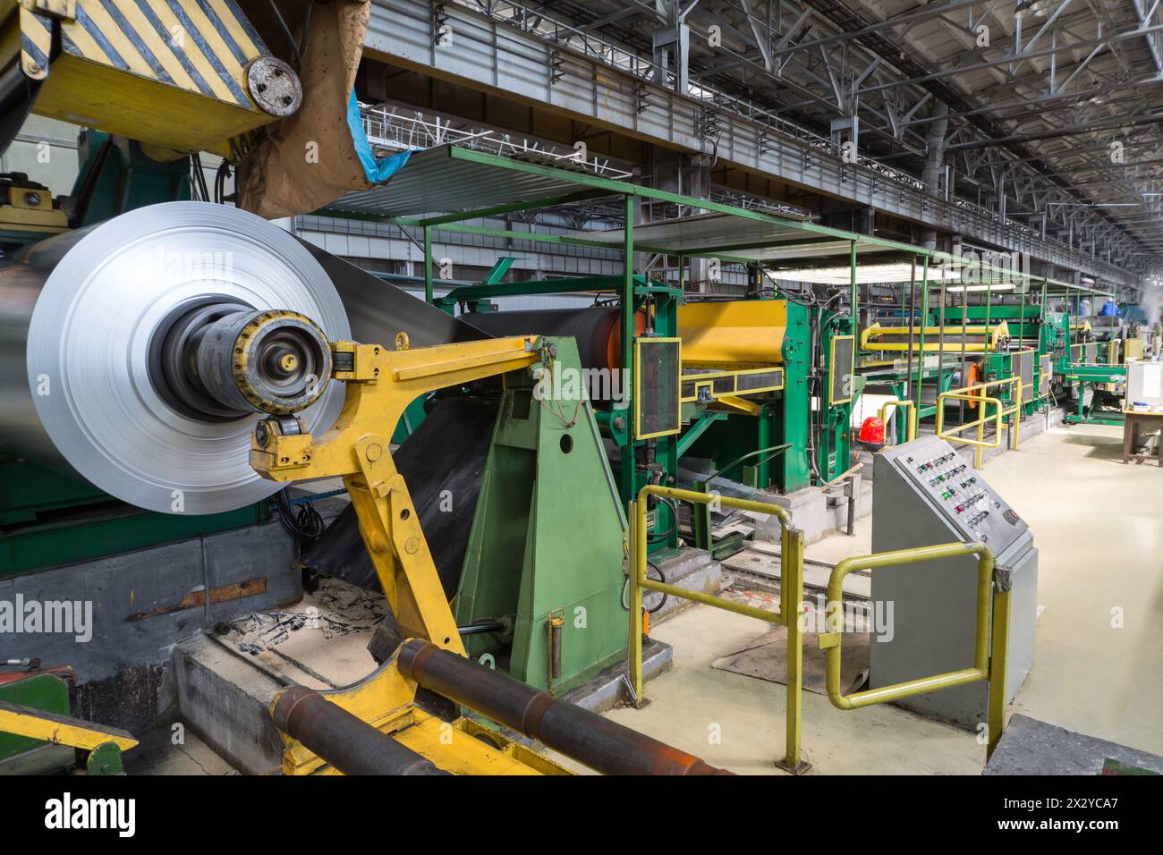 Roll aluminum rotates on machine hi-res stock photography and images ...