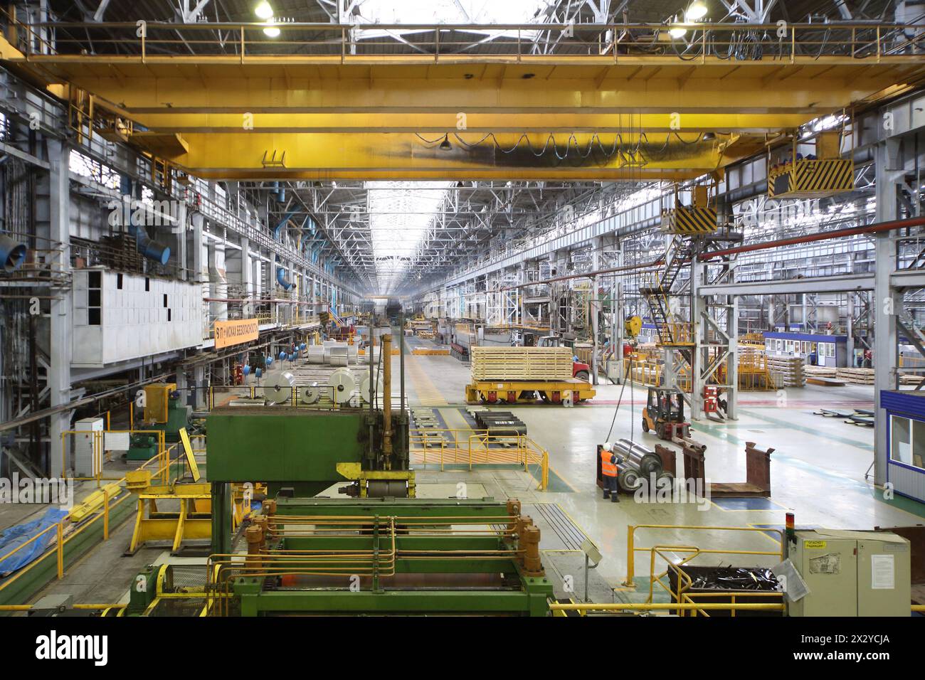 Long workshop with equipment for aluminum rolling Stock Photo - Alamy