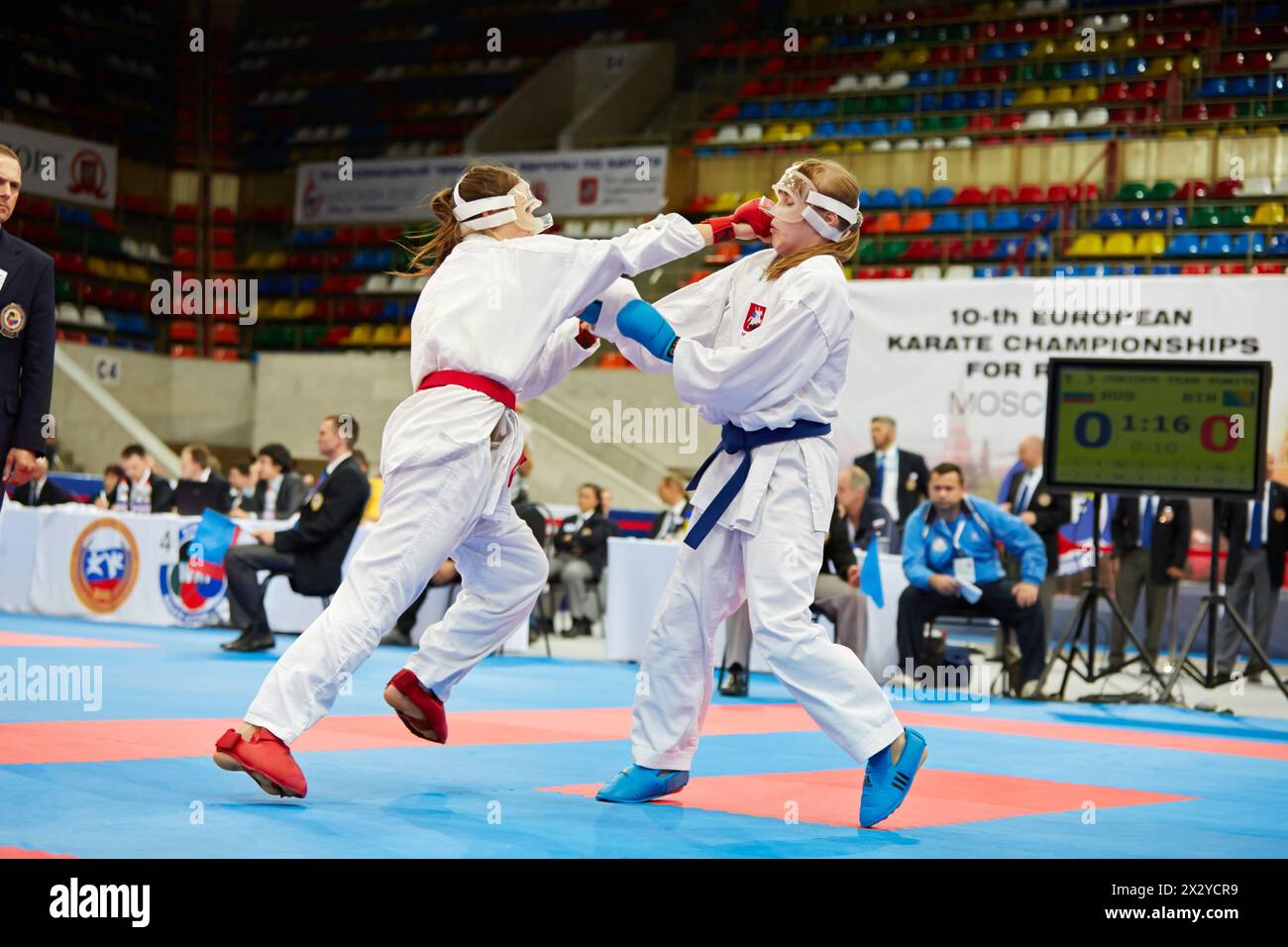 MOSCOW - JUN 9: Female fighter attacks opponent in head during fight at ...