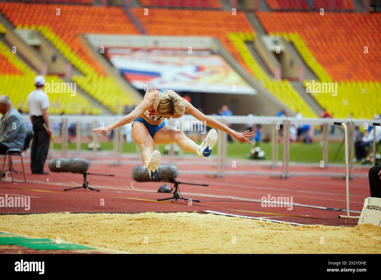 MOSCOW - JUN 11: Female athlete in long jump place at Grand Sports ...