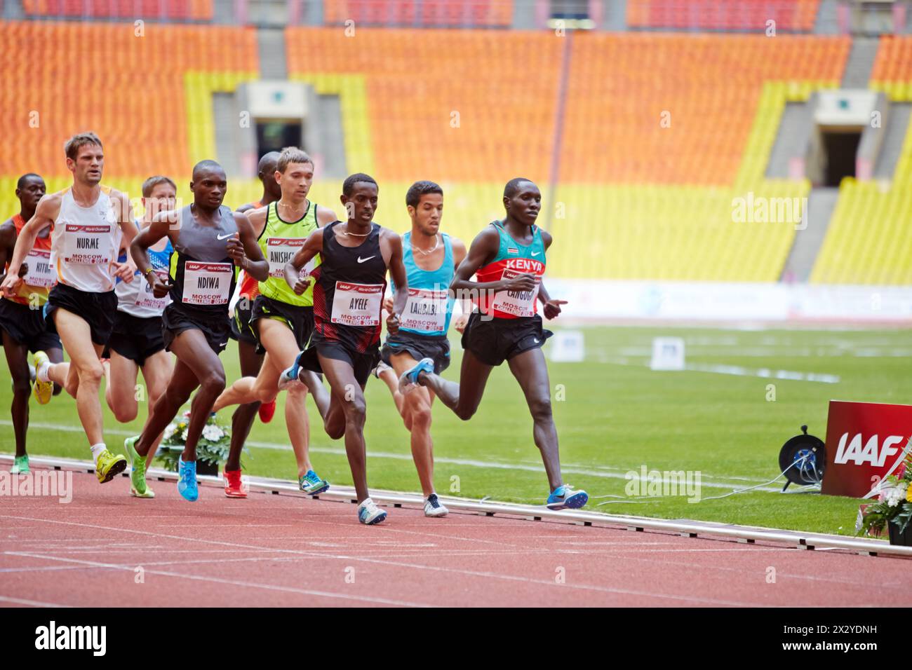 MOSCOW - JUN 11: Group of runners on race track at Grand Sports Arena ...