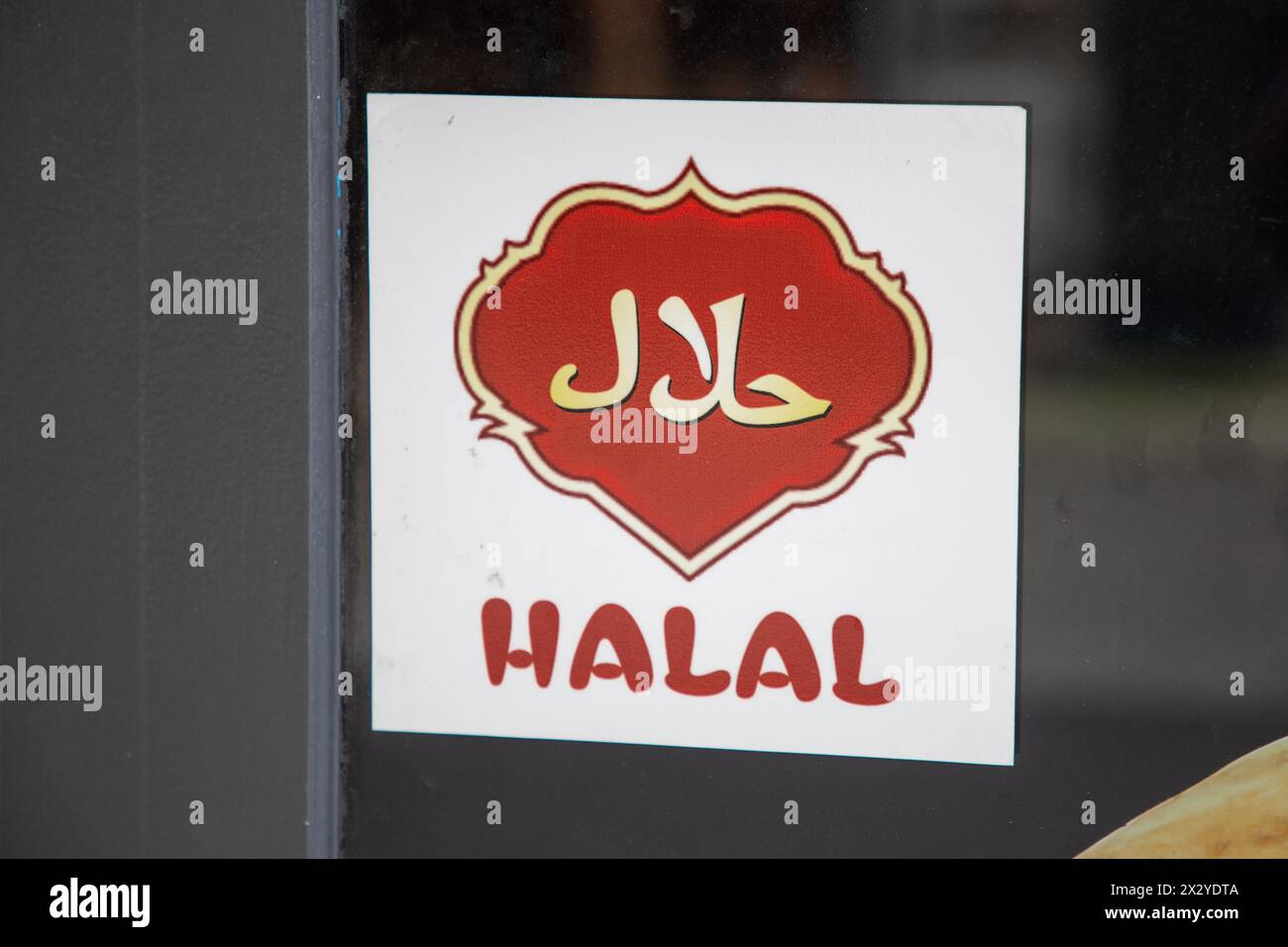 Halal text sign arab in windows facade shop food boutique Stock Photo ...